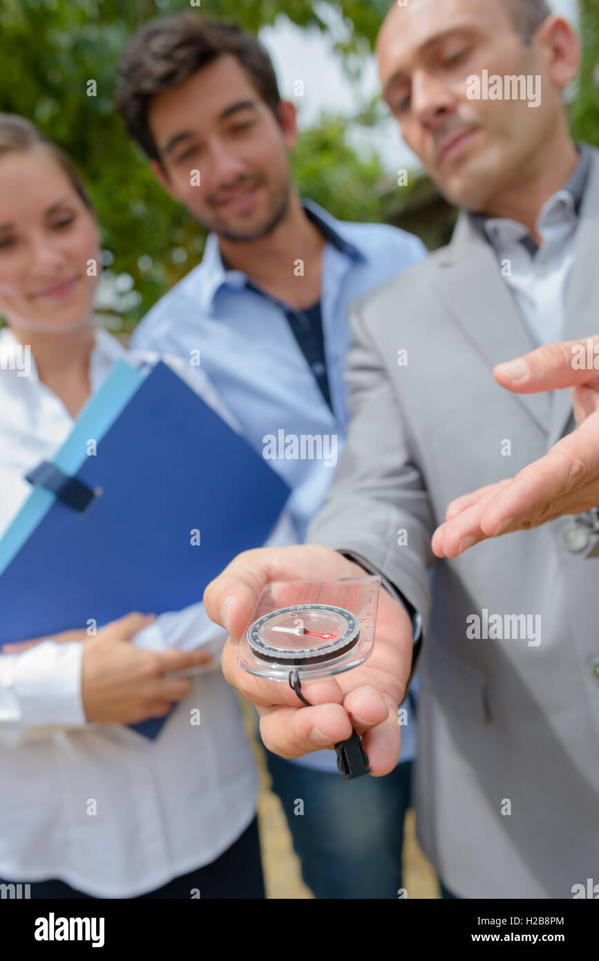man with compass Stock Photo - Alamy