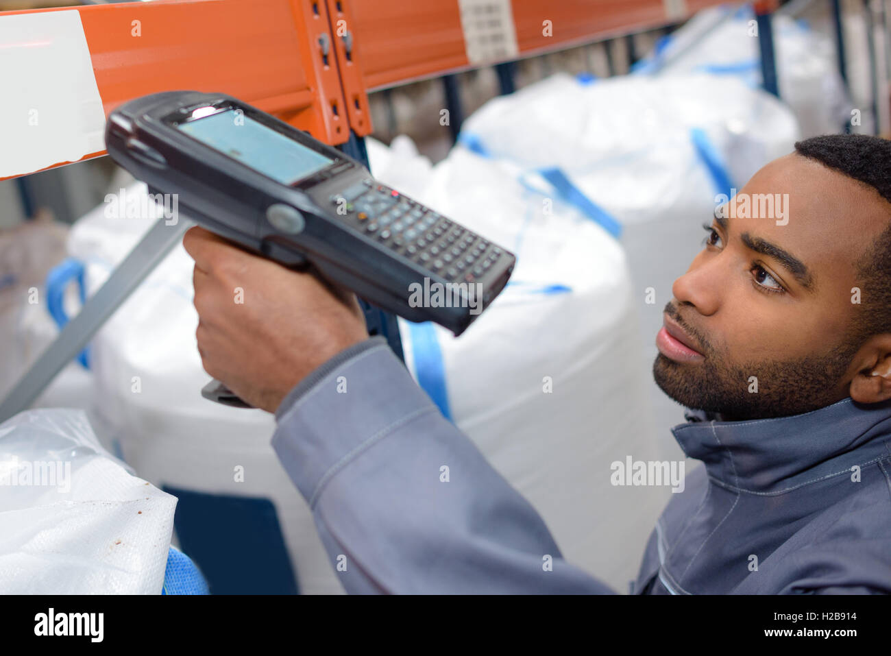 worker scanning the product Stock Photo - Alamy