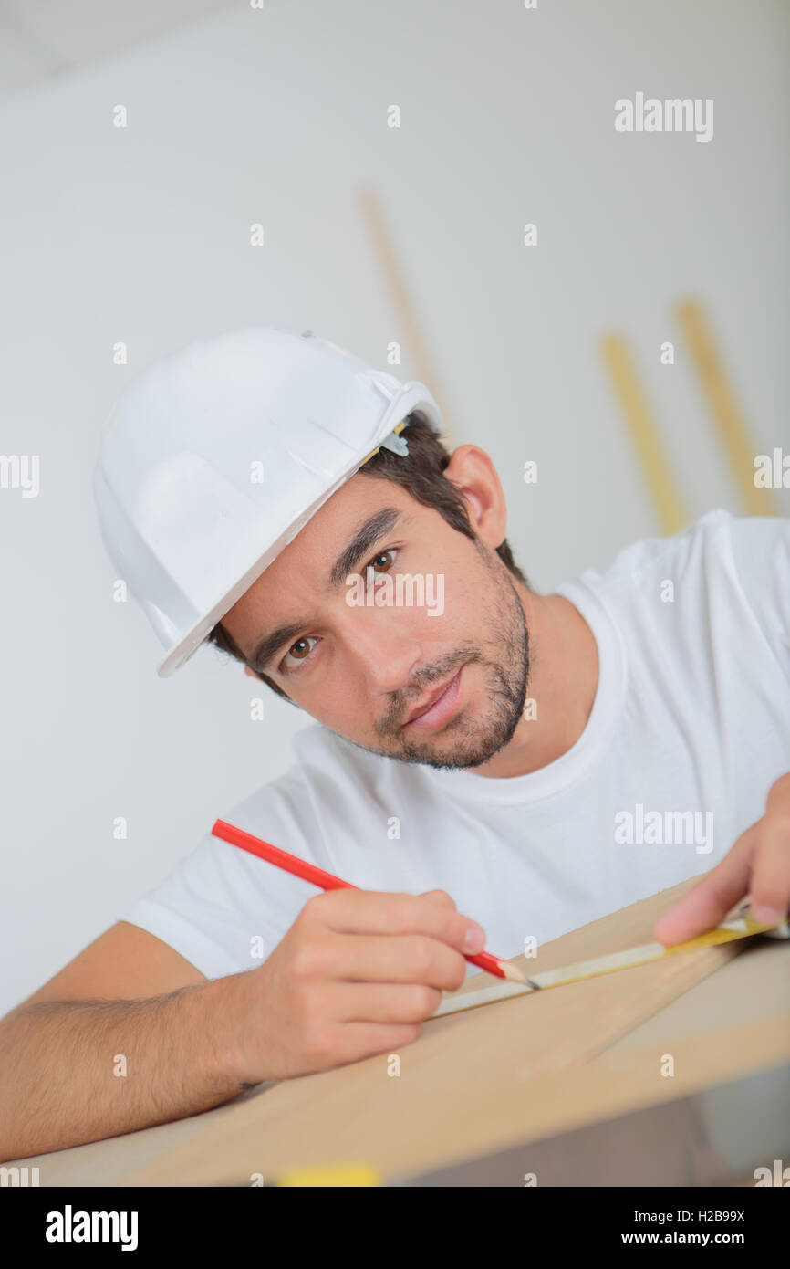Man marking wood pencil hi-res stock photography and images - Alamy