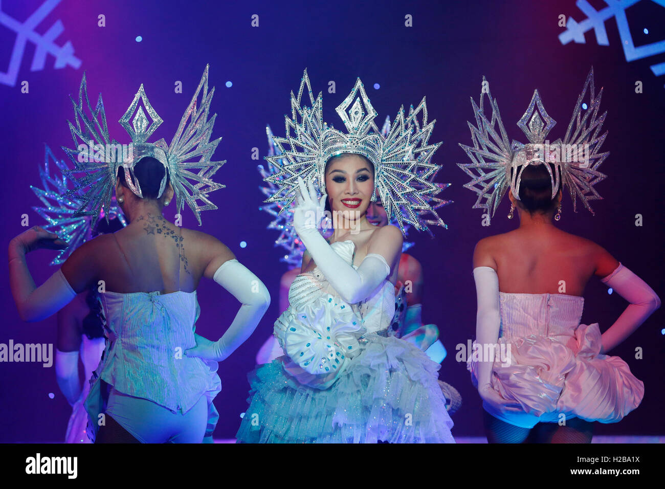 Performers sing and dance during the stage show "Beauties and the Beats ...