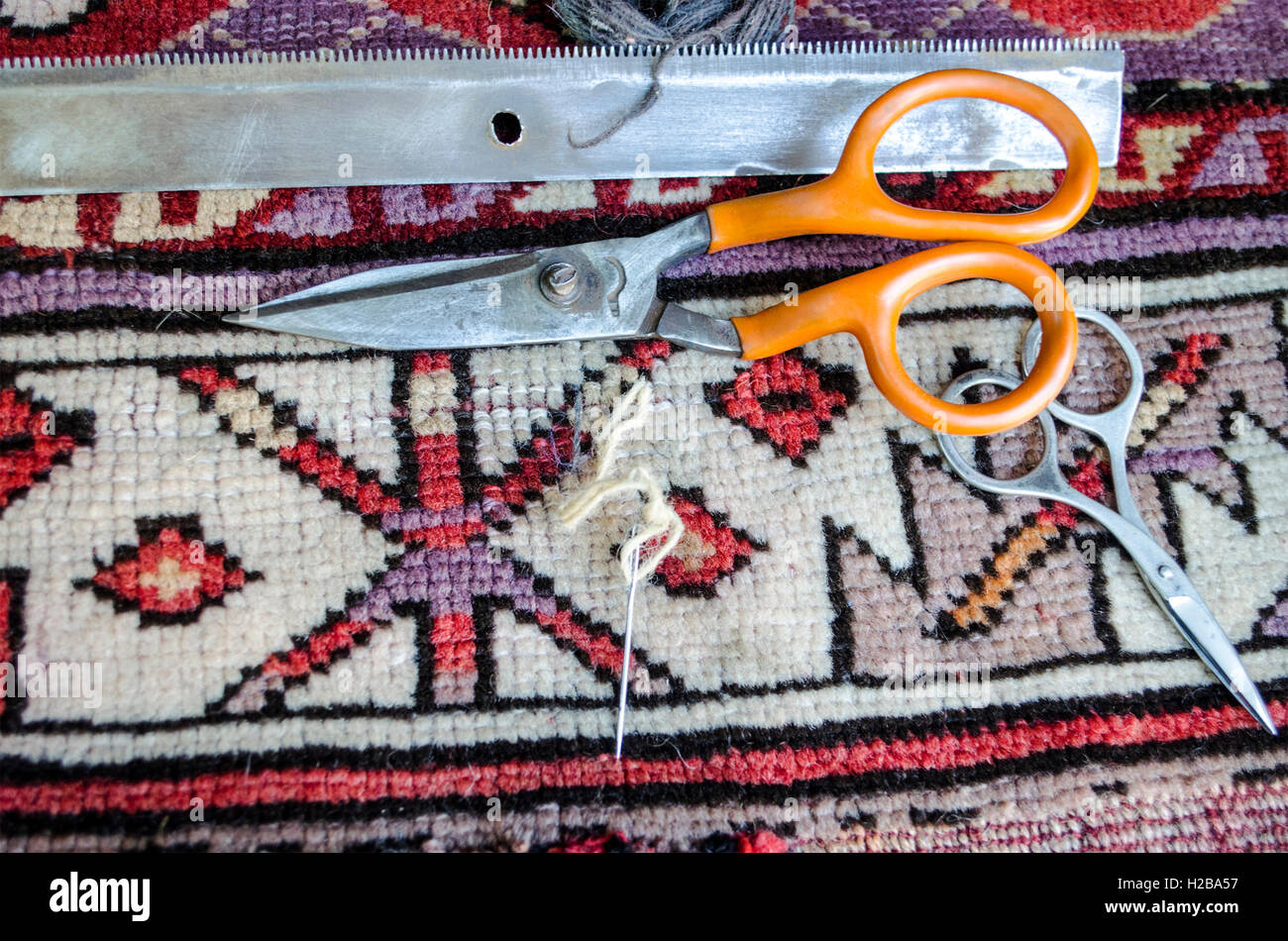 Worn out edge old carpet from tools for restoration Stock Photo - Alamy