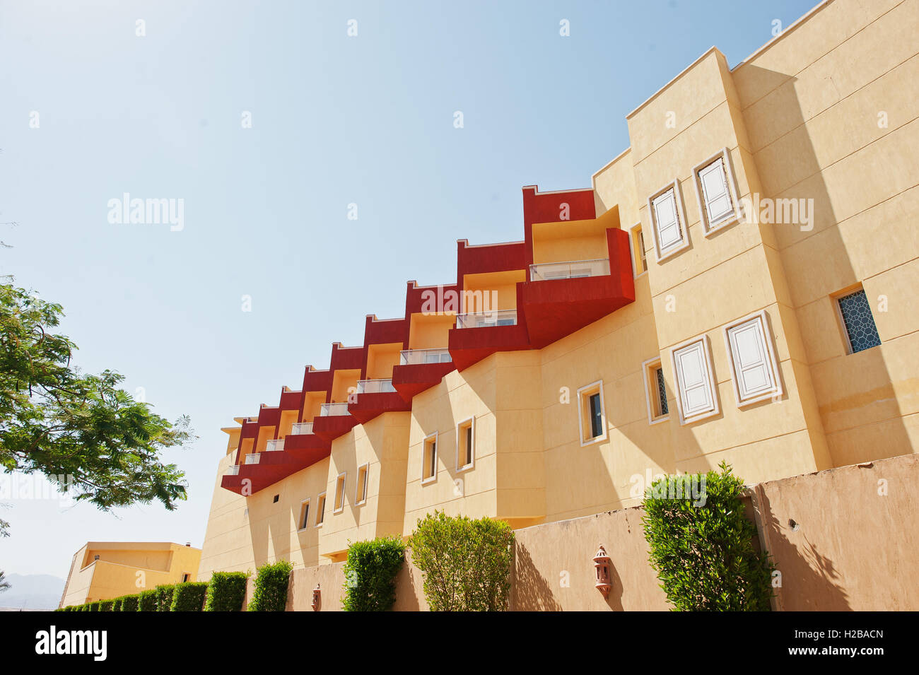 Windows and balconies of resort house at sun day Stock Photo - Alamy