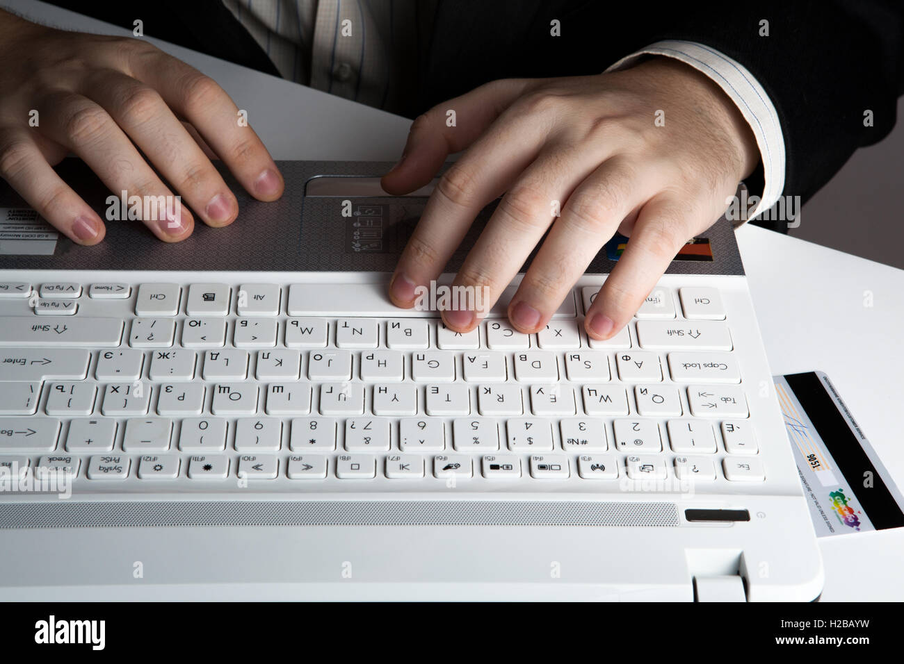 human hands on the notebook keyboard Stock Photo - Alamy