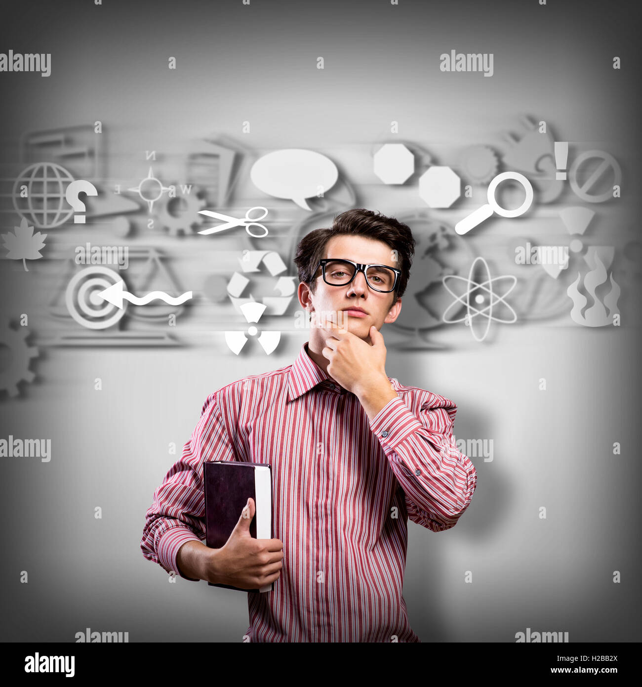 young man scientist with glasses thinking Stock Photo - Alamy