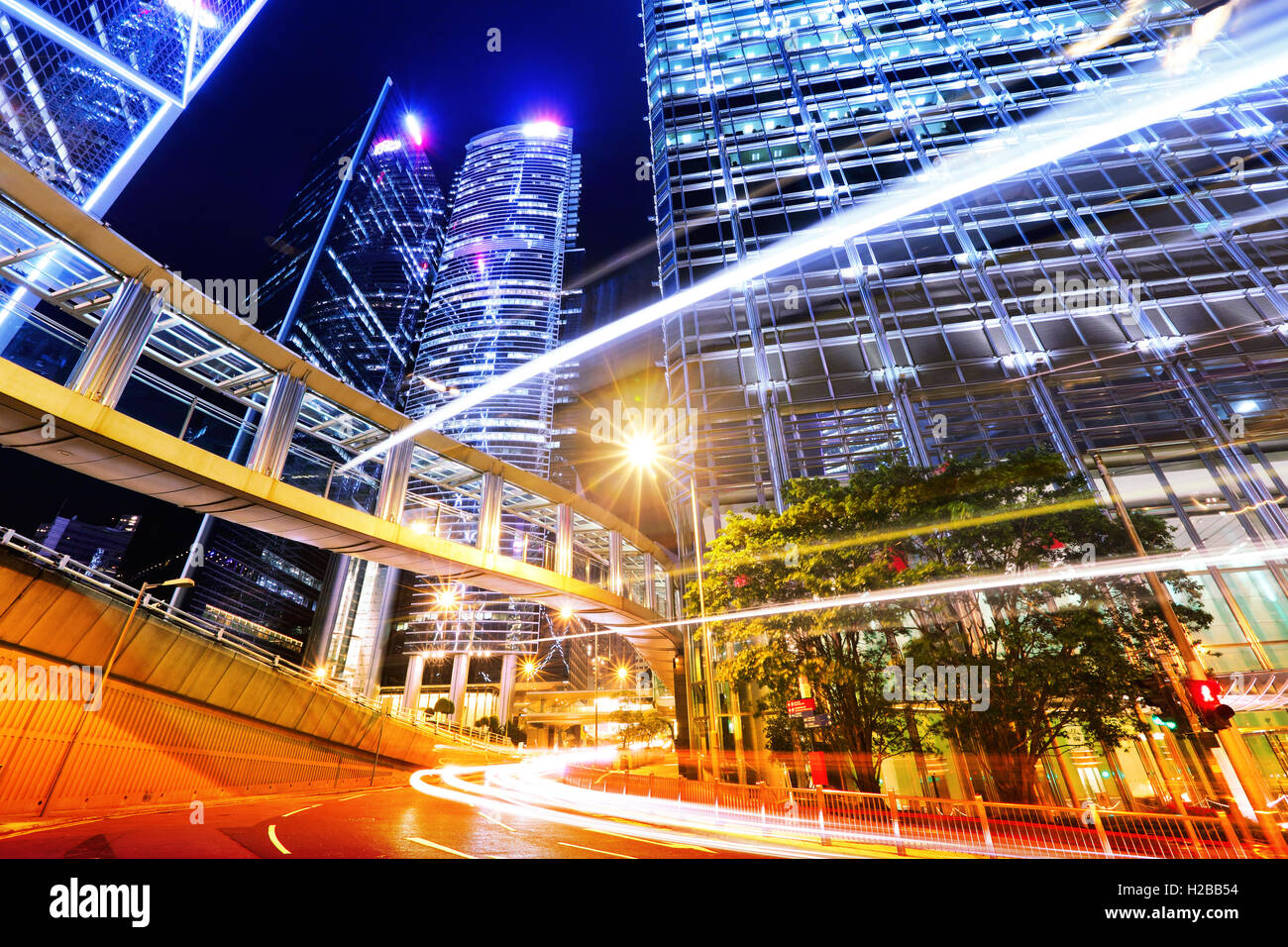 Modern city with traffic trail Stock Photo - Alamy