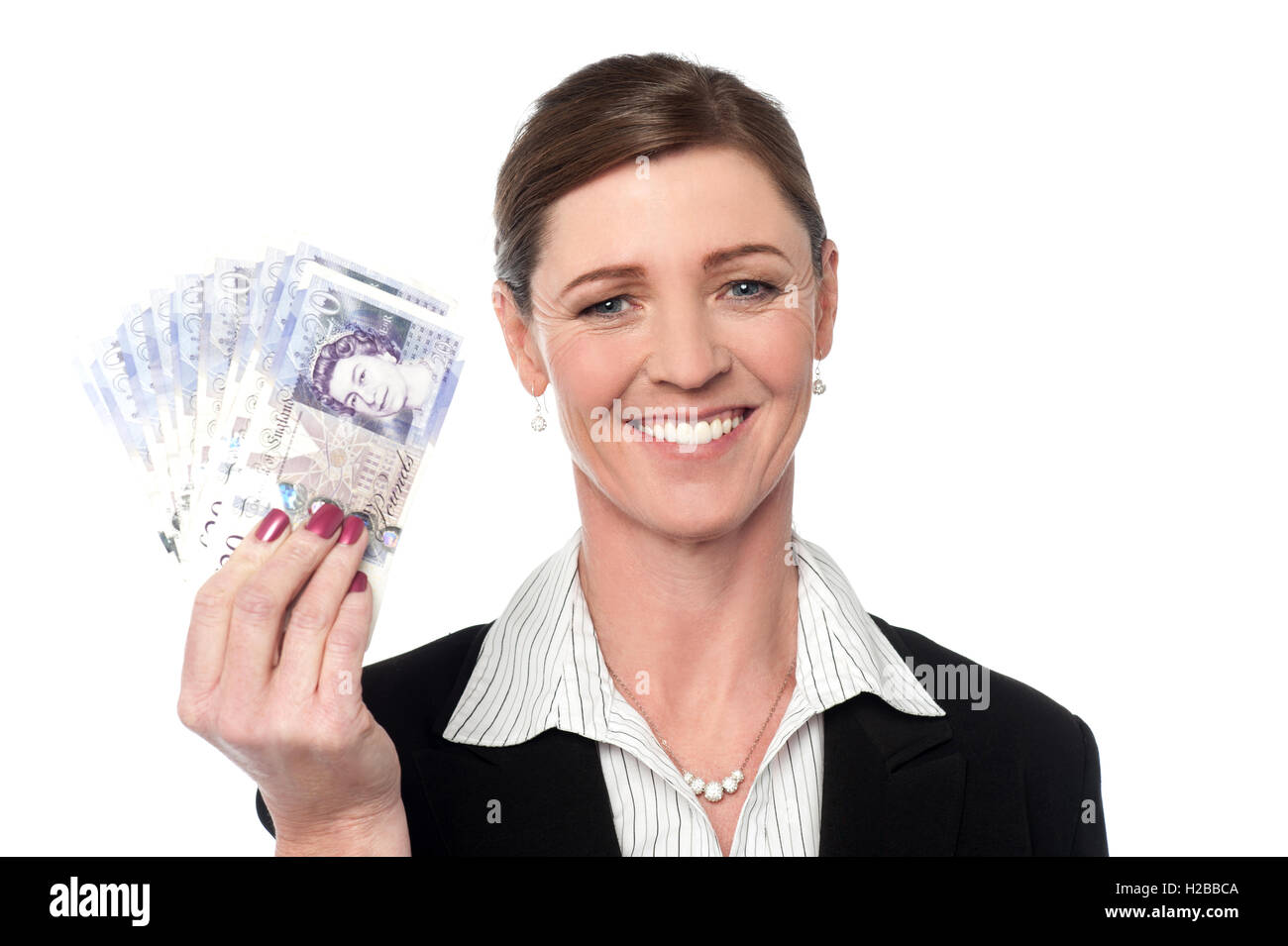 Smiling business woman holding money Stock Photo - Alamy Smiling business woman holding money Stock Photo - Alamy