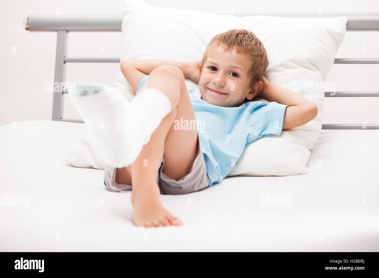 Little child boy with plaster bandage on leg heel fracture or br Stock ...