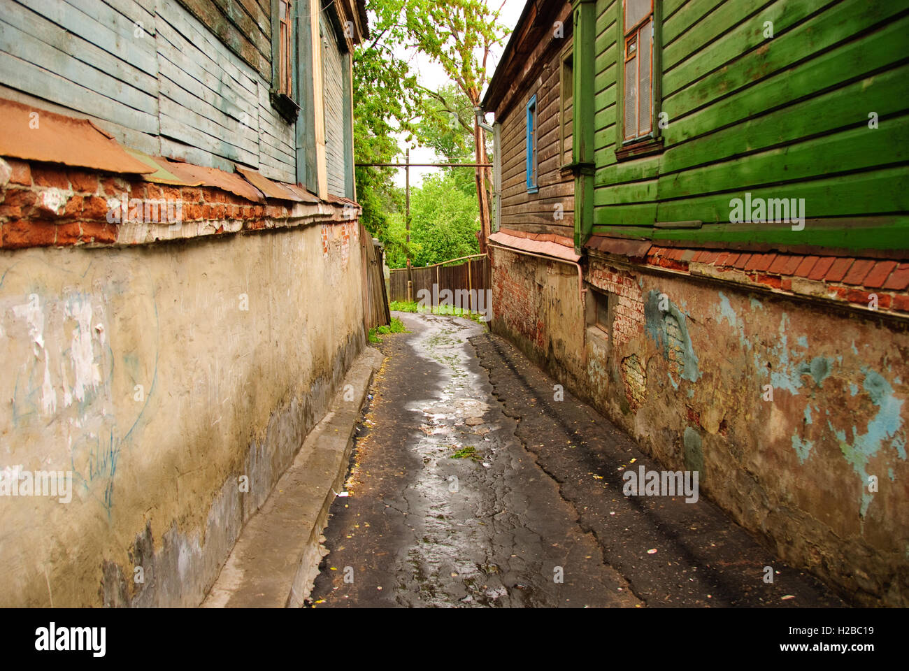 Narrow wet street between old houses at Vladimir city, Russia Stock ...