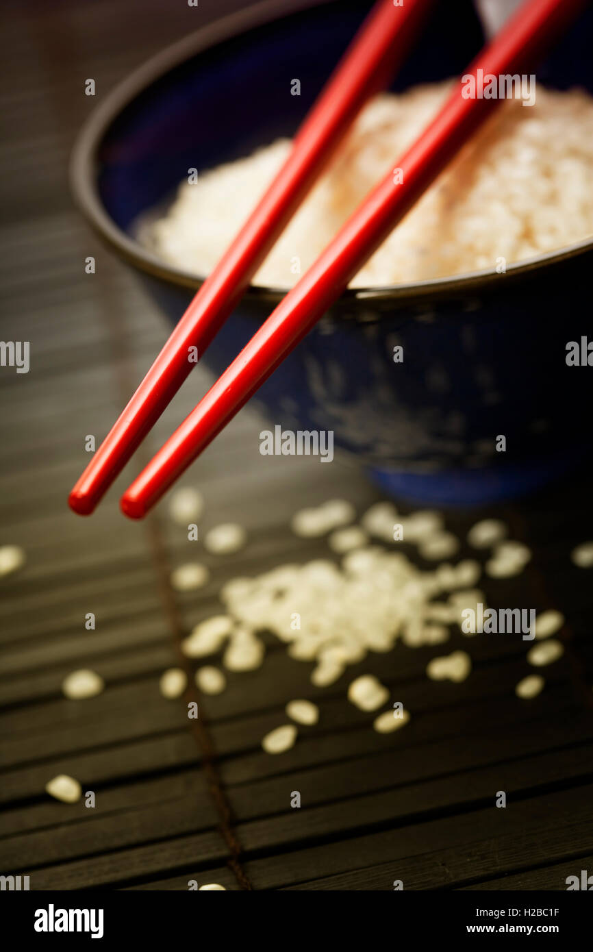 Bowl of rice and chopsticks Stock Photo - Alamy
