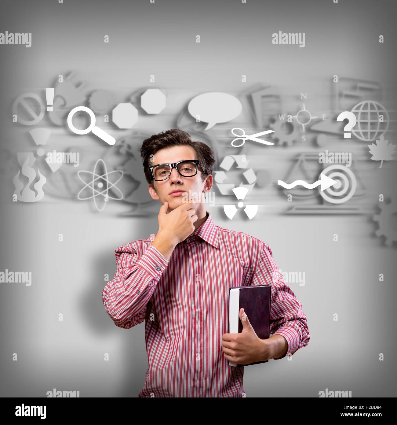 young man scientist with glasses thinking Stock Photo - Alamy