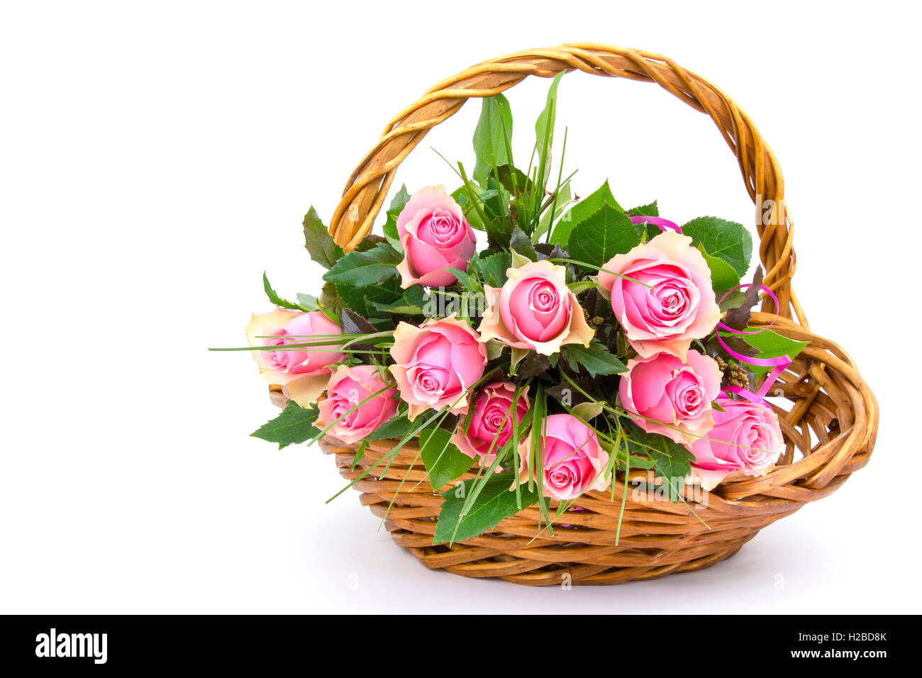 pink roses in a basket Stock Photo - Alamy