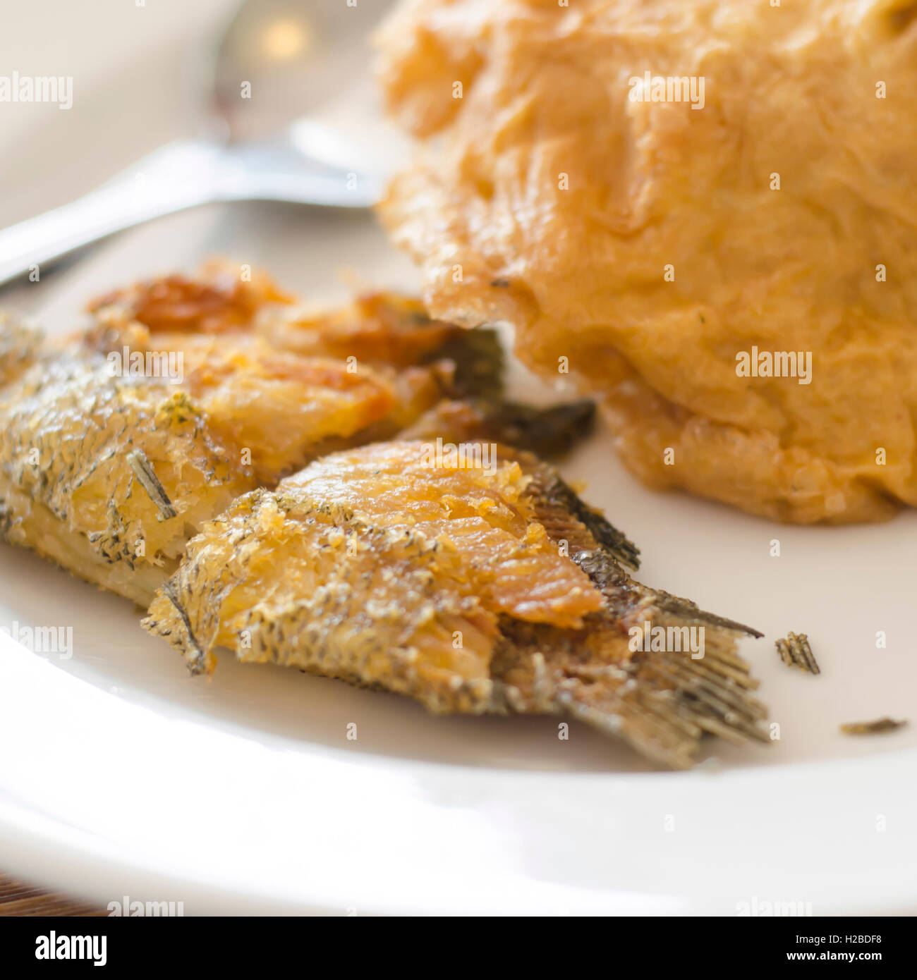 fried fish and omelet in dish Stock Photo - Alamy