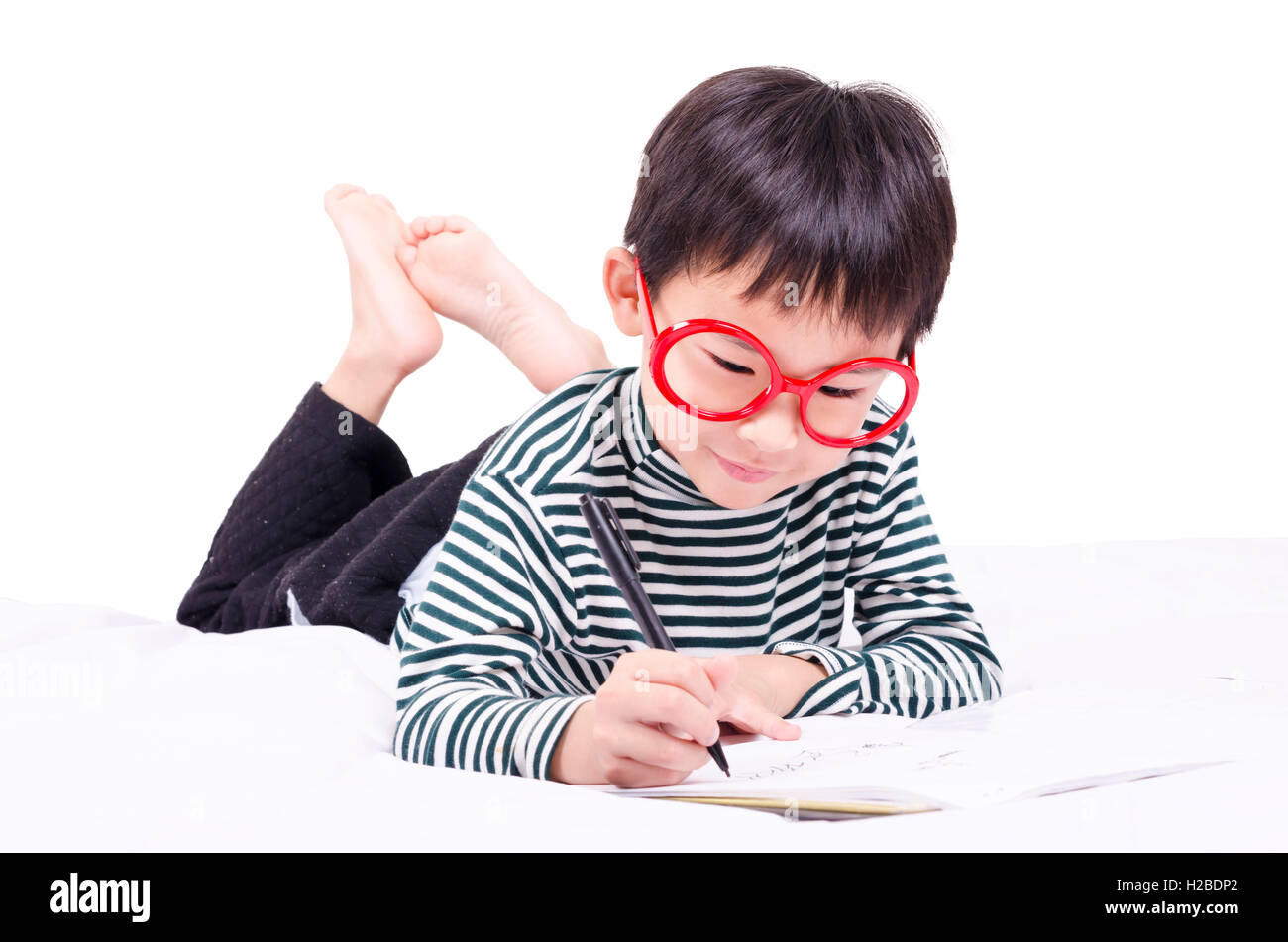 Smart boy learn to write Stock Photo - Alamy