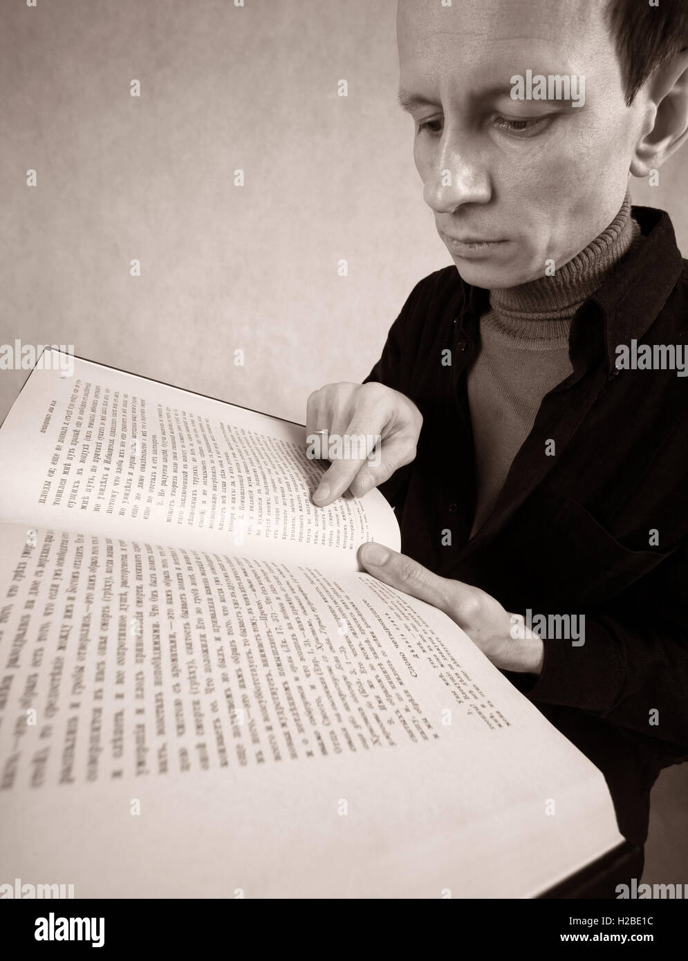 Man with the book Stock Photo - Alamy