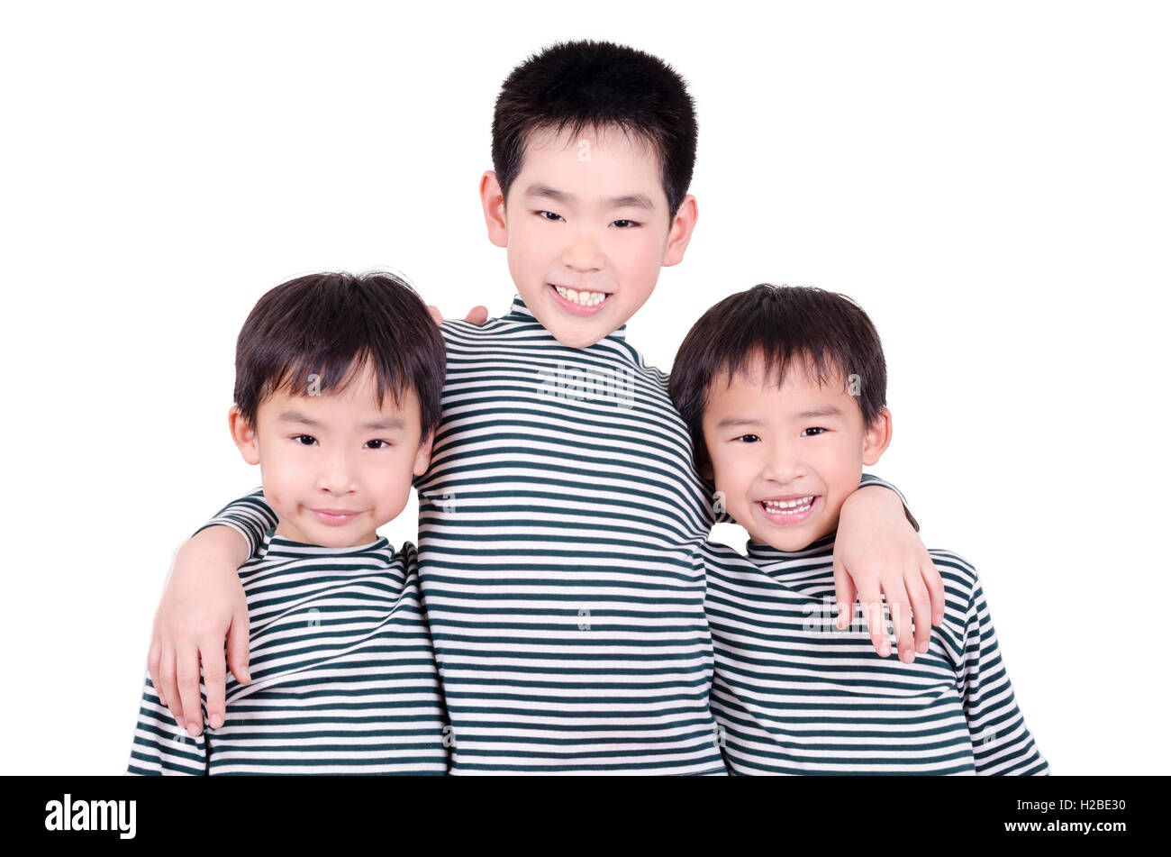 Happy family with three kids Stock Photo - Alamy