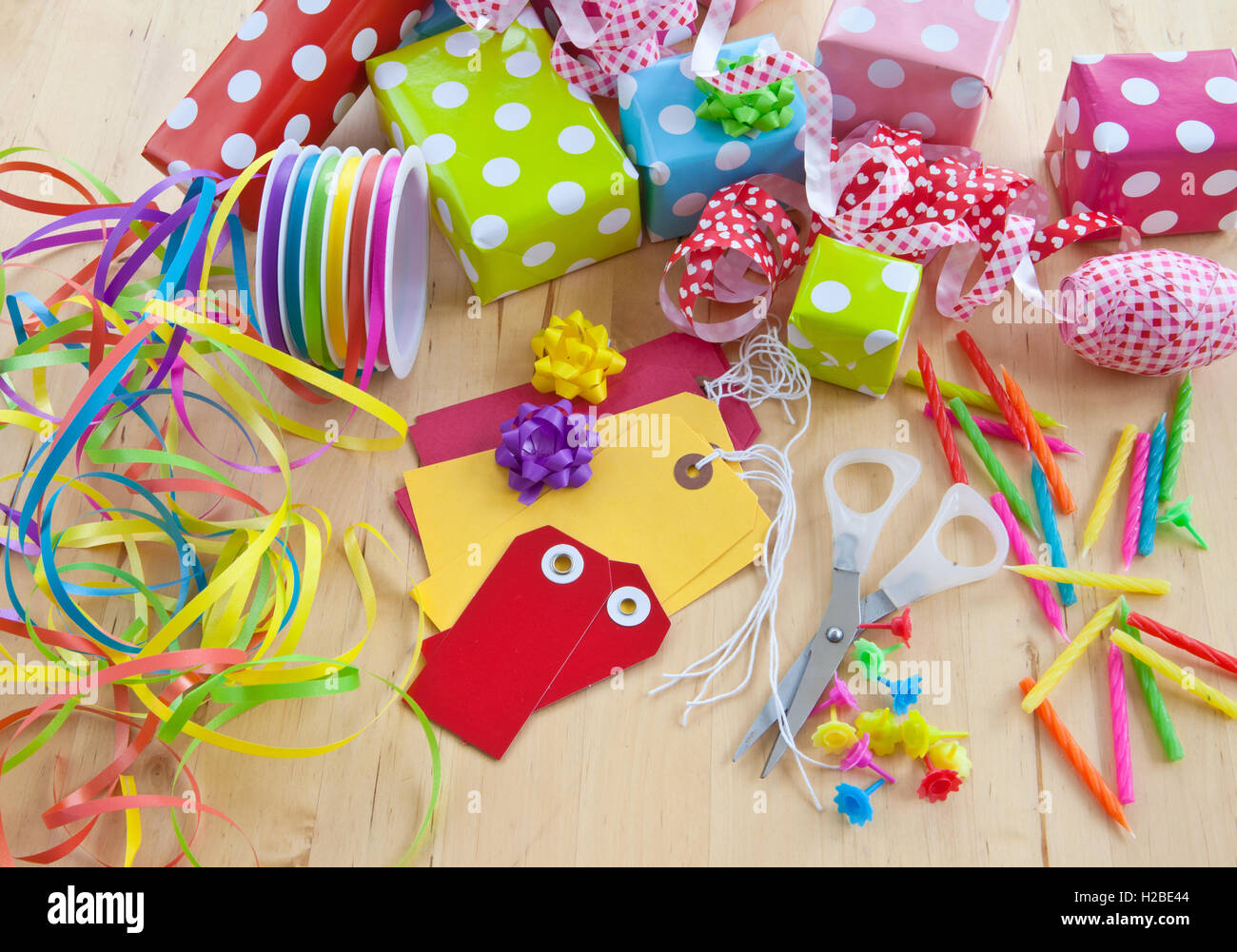 Colorful gift boxes wrapped in dotted paper Stock Photo - Alamy Colorful gift boxes wrapped in dotted paper Stock Photo - Alamy