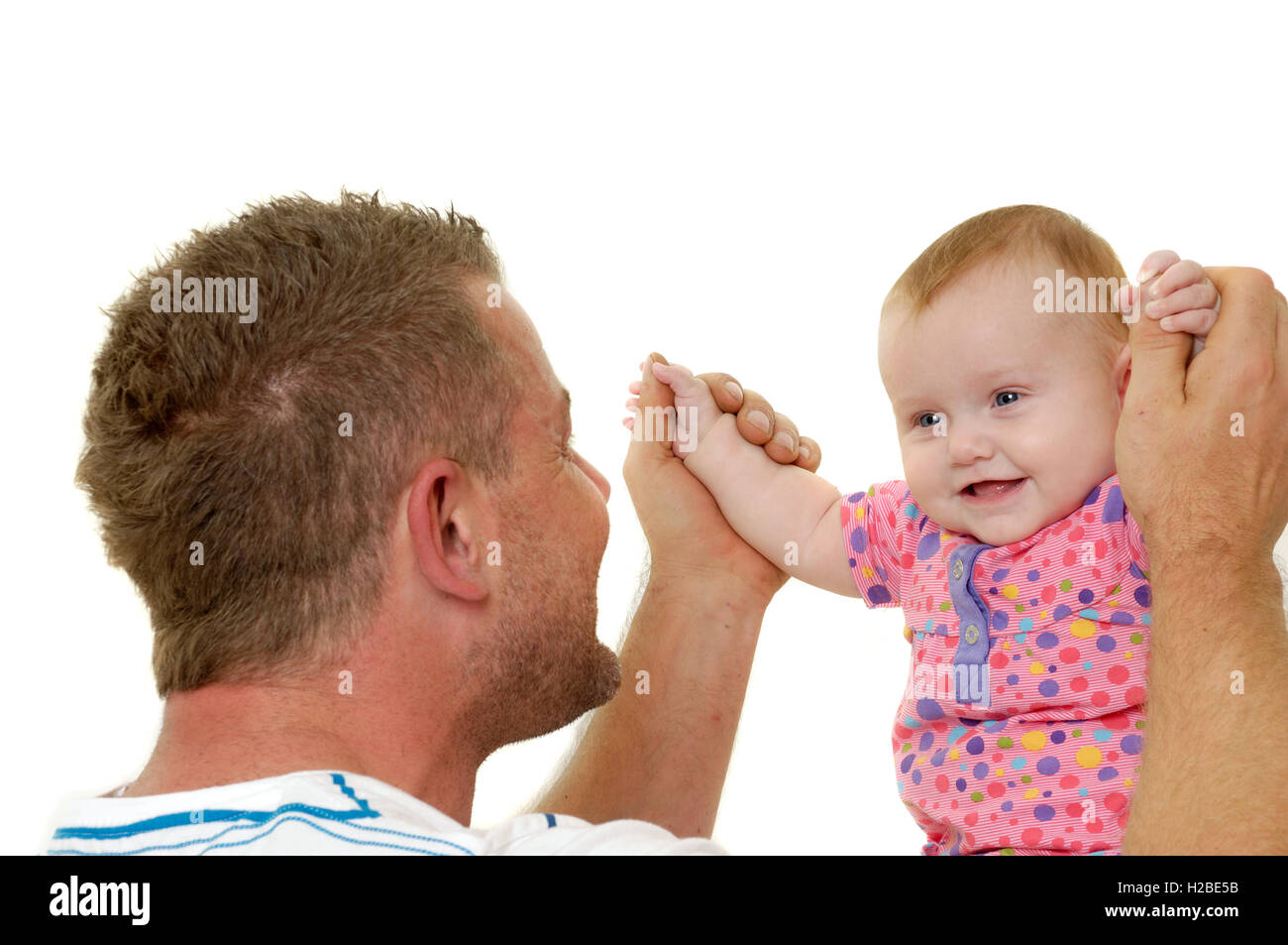 Smiling father and baby Stock Photo - Alamy