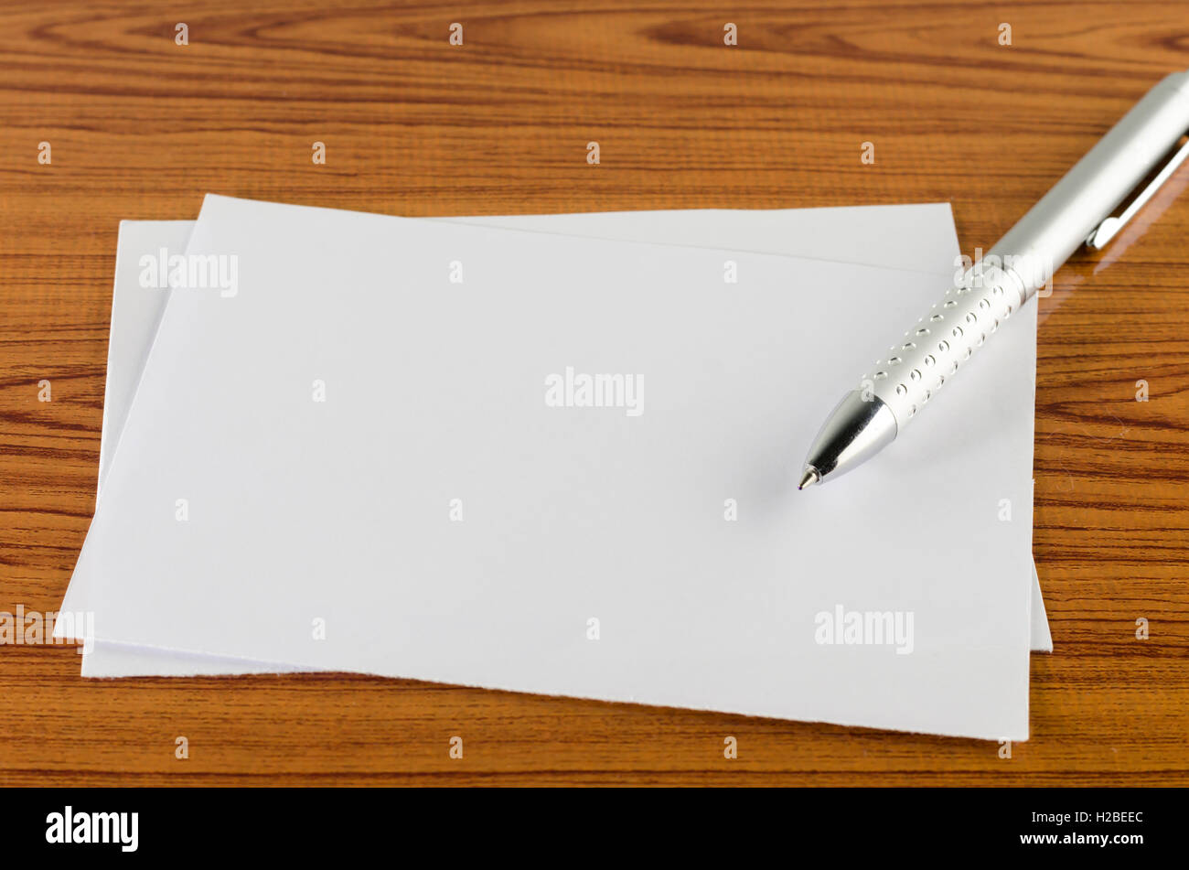 pen with white paper Stock Photo - Alamy