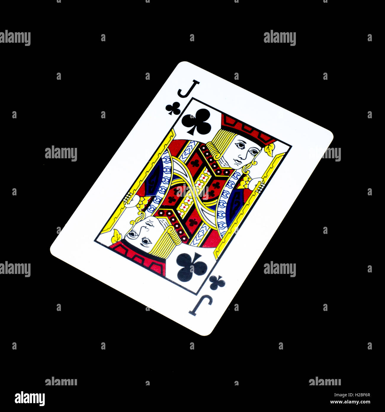 Jack clover card isolated on black Stock Photo - Alamy