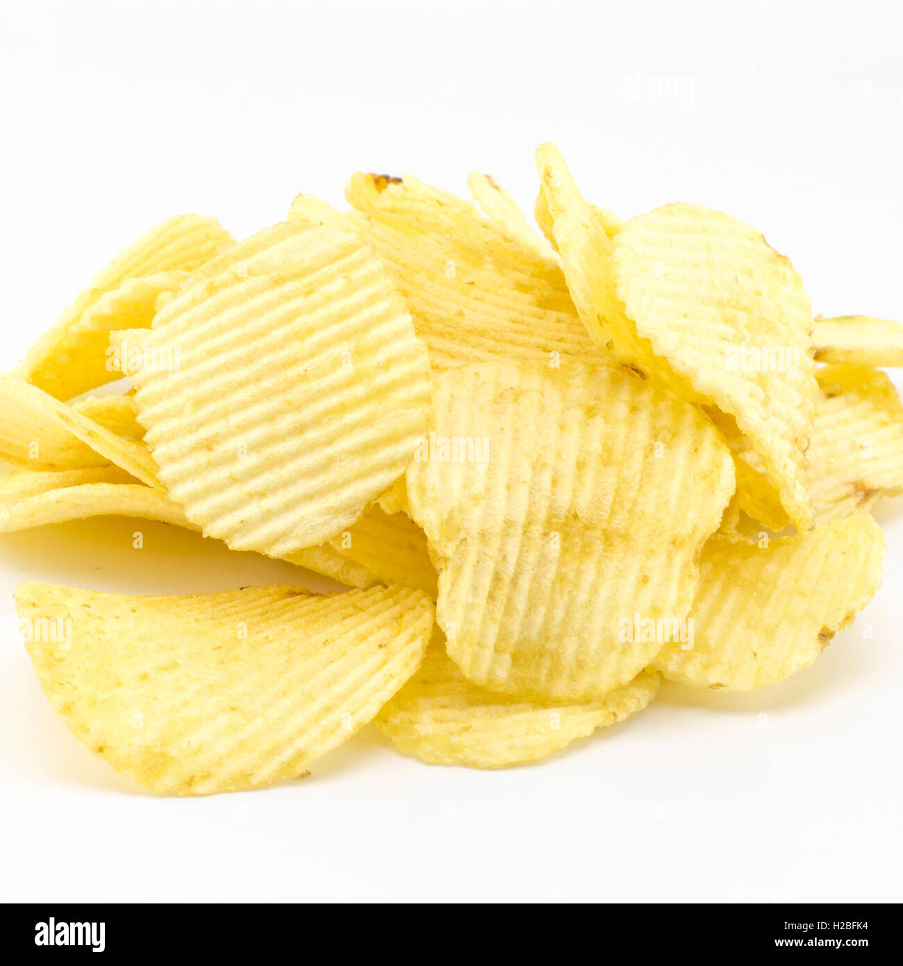 snack potato chips isolated on white Stock Photo - Alamy