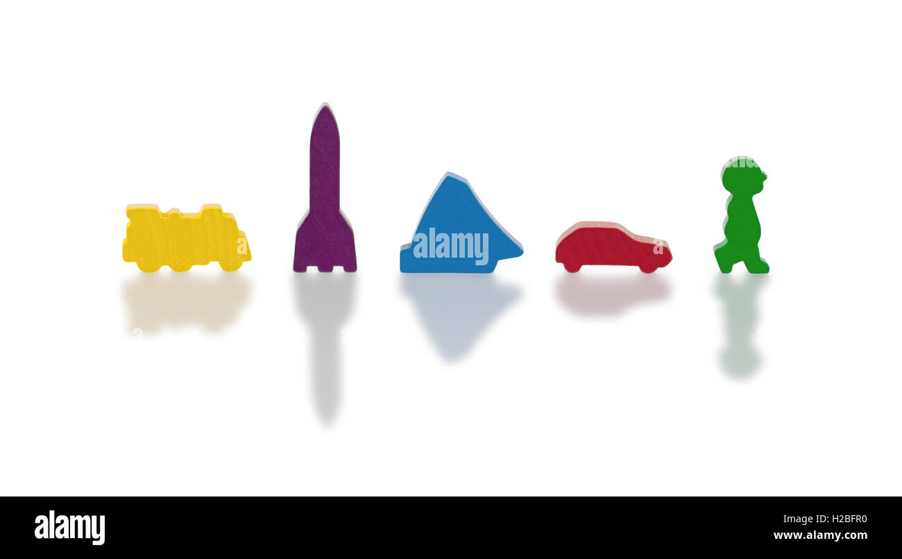 Small wooden toys isolated Stock Photo - Alamy