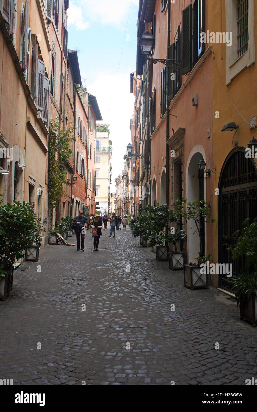 Typical narrow street scene in Rome, Italy Stock Photo - Alamy