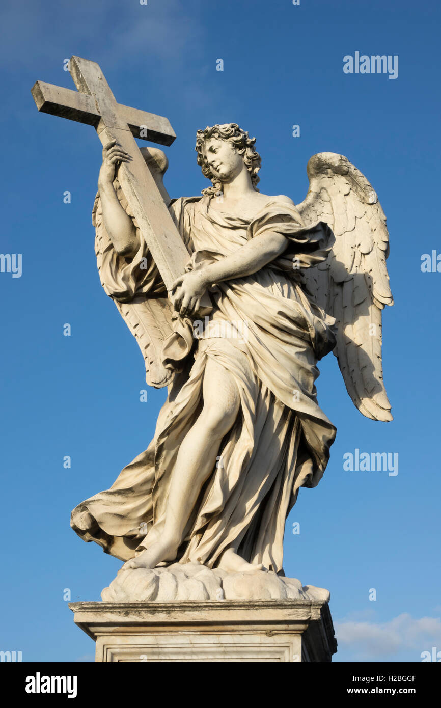 Angel with the cross Stock Photo - Alamy