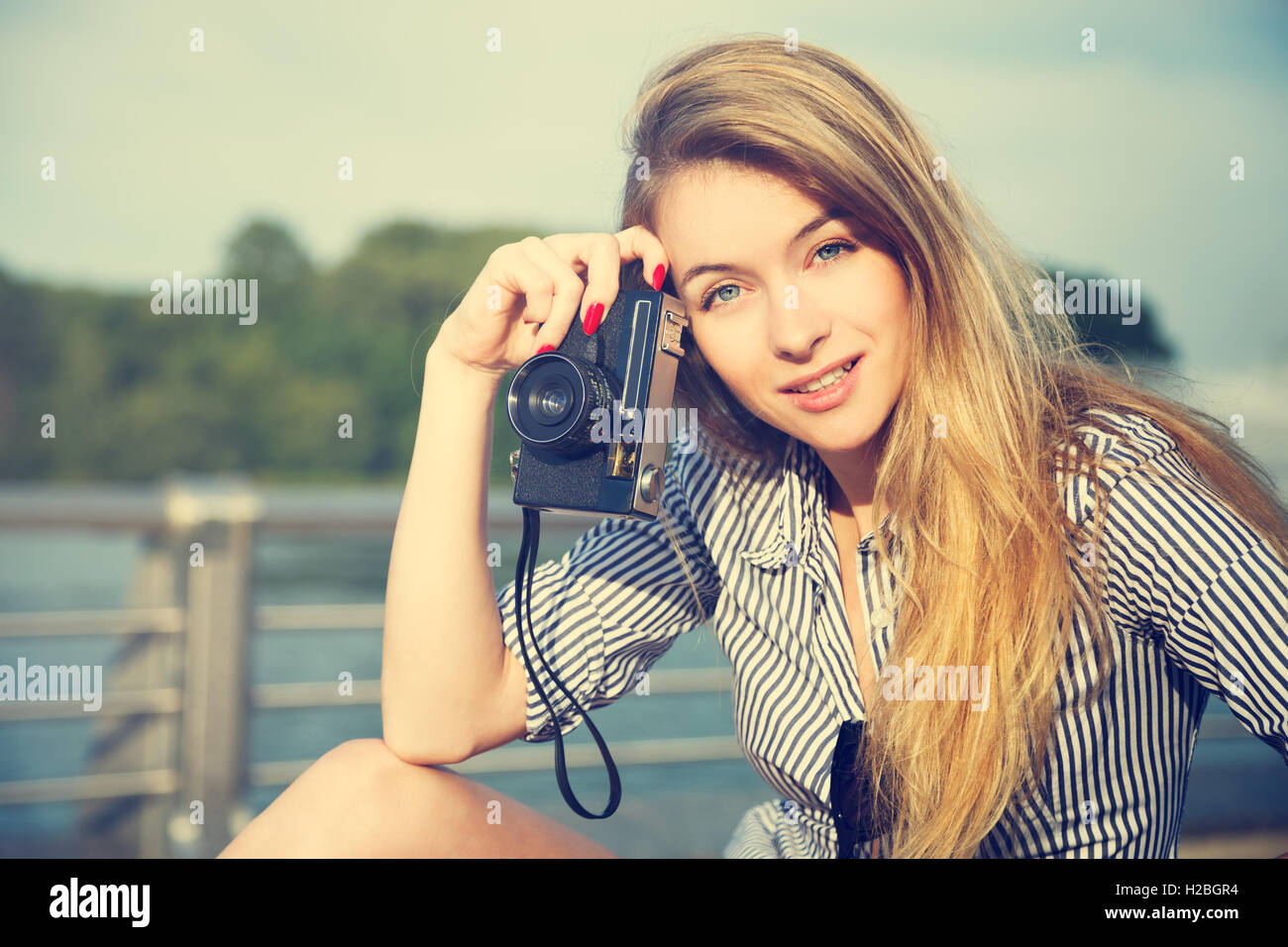 Beautiful Hipster Girl with Photo Camera Stock Photo - Alamy Beautiful Hipster Girl with Photo Camera Stock Photo - Alamy