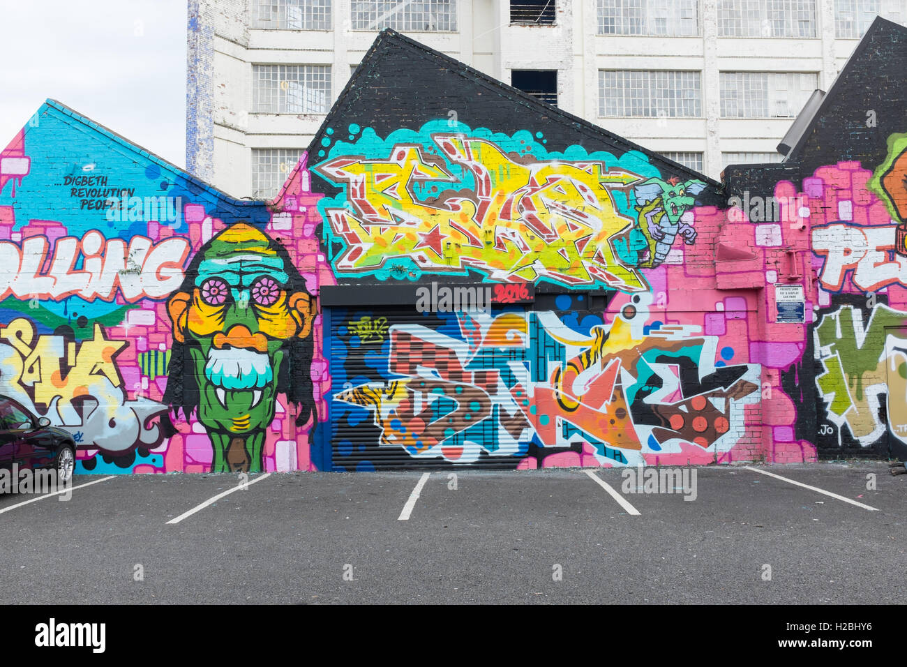 Walls painted with graffiti in a car park behind The Custard Factory in ...