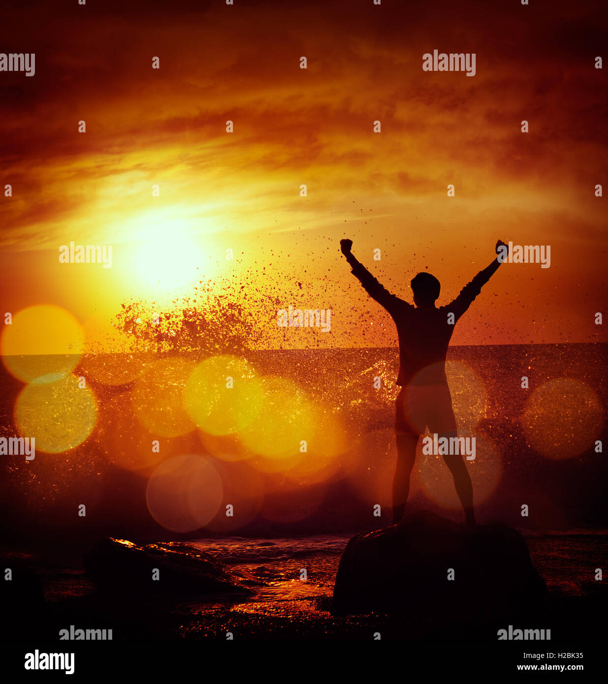 Figure of Man at Stormy Sea over Dramatic Sunset Stock Photo - Alamy