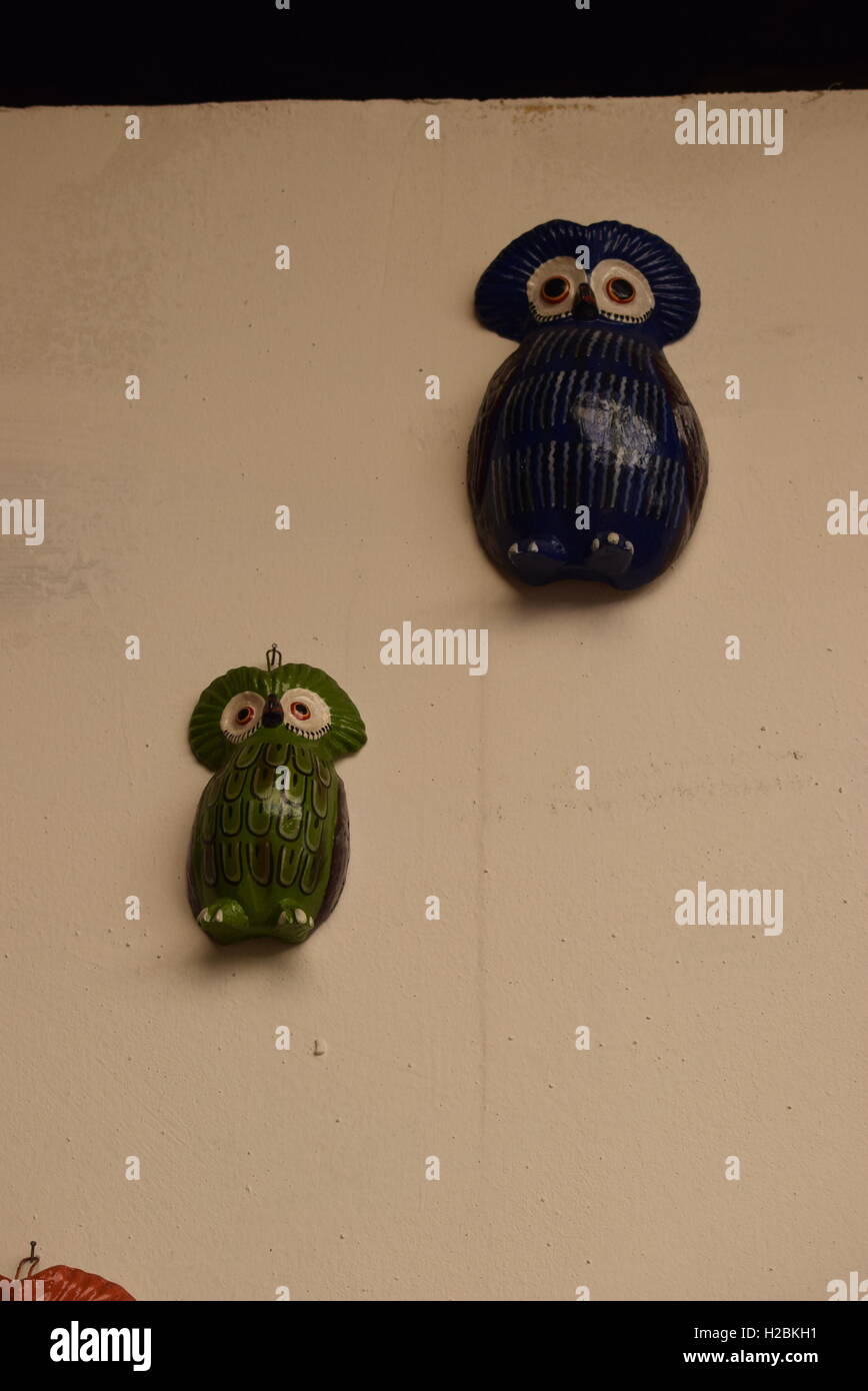 Decoration Owls hanging on a wall Stock Photo - Alamy