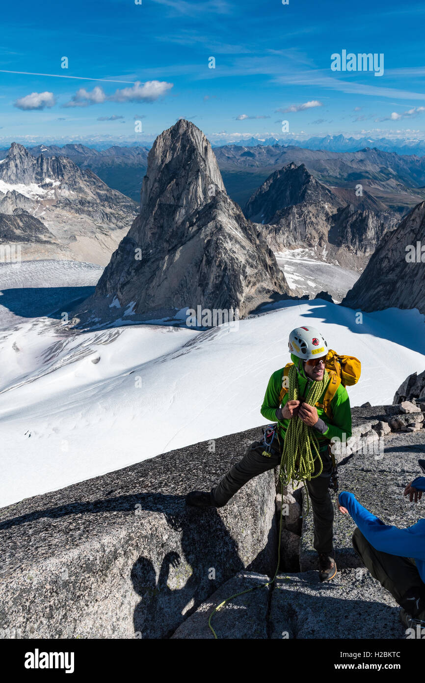 Troy Cobb on the summit of Pigeon Spire in the Bugaboo Provincial Park ...