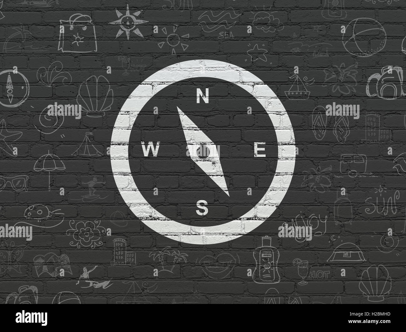 Vacation concept: Compass on wall background Stock Photo - Alamy