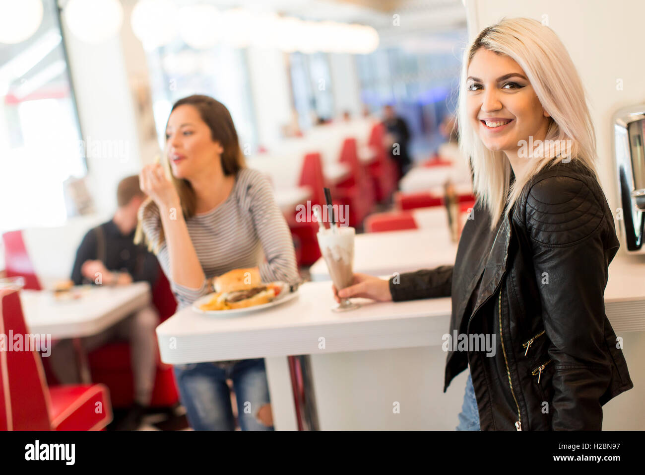 View of the people meeting in the diner Stock Photo - Alamy