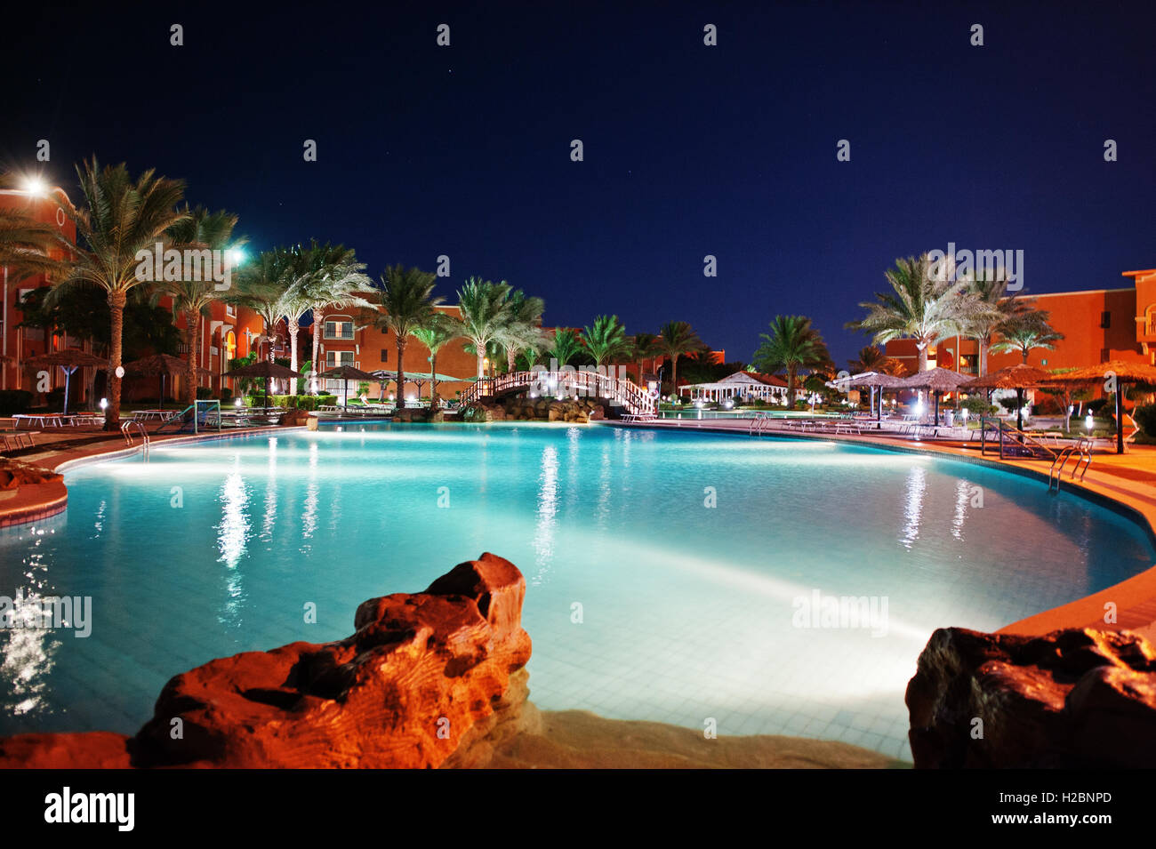 Swimming pool of a luxury tropical caribbean resort at night Stock ...