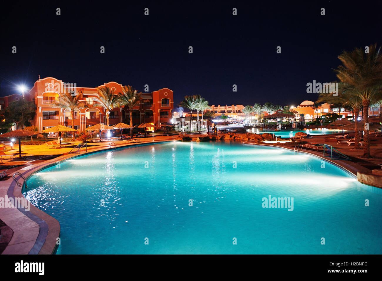 Swimming pool of a luxury tropical caribbean resort at night Stock ...