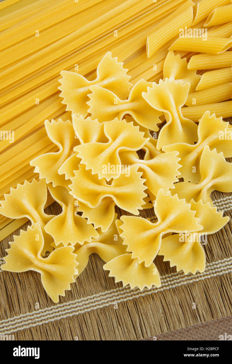 raw pasta closeup on table Stock Photo - Alamy