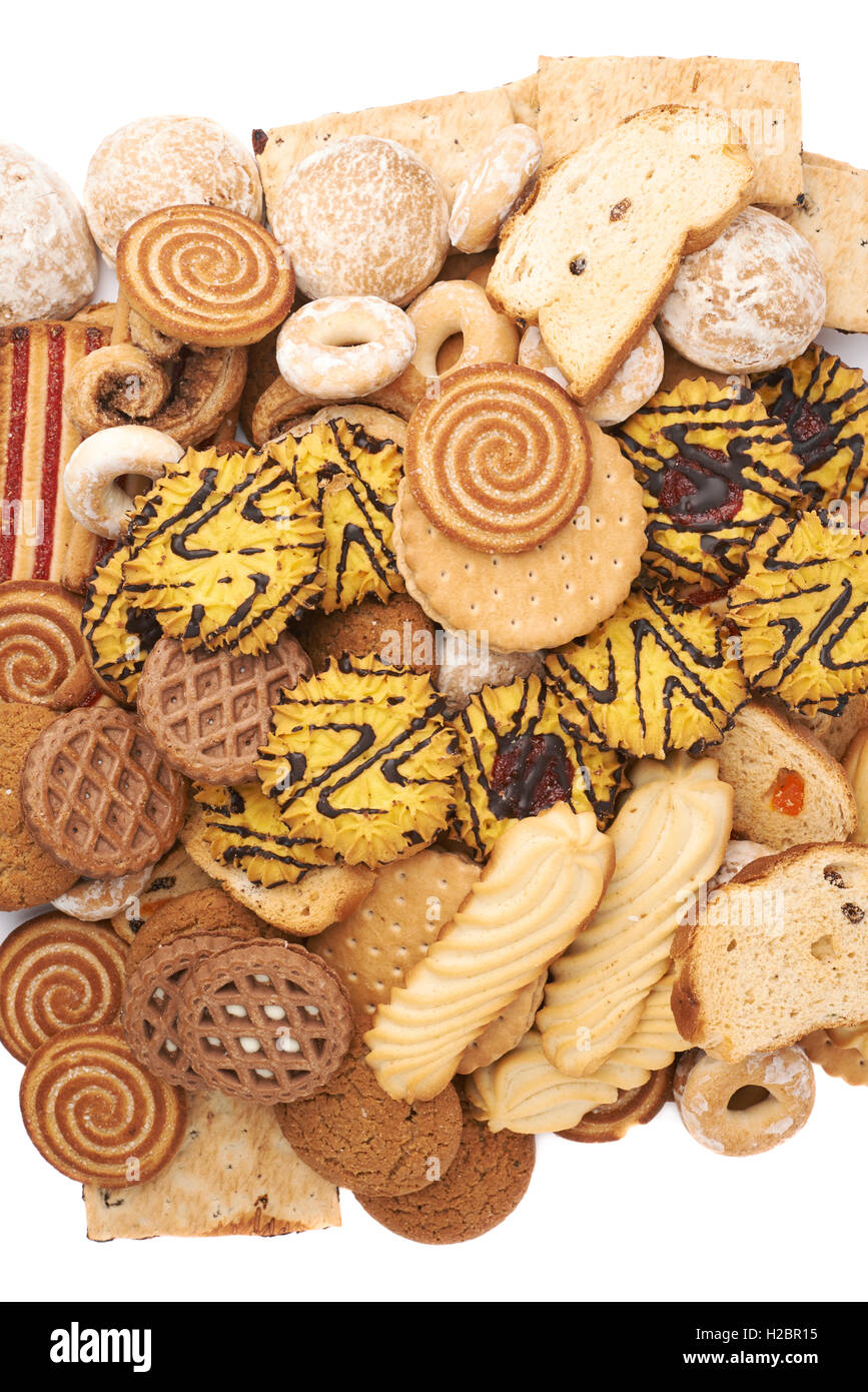 Pile of mix cookies isolated over the white background Stock Photo - Alamy