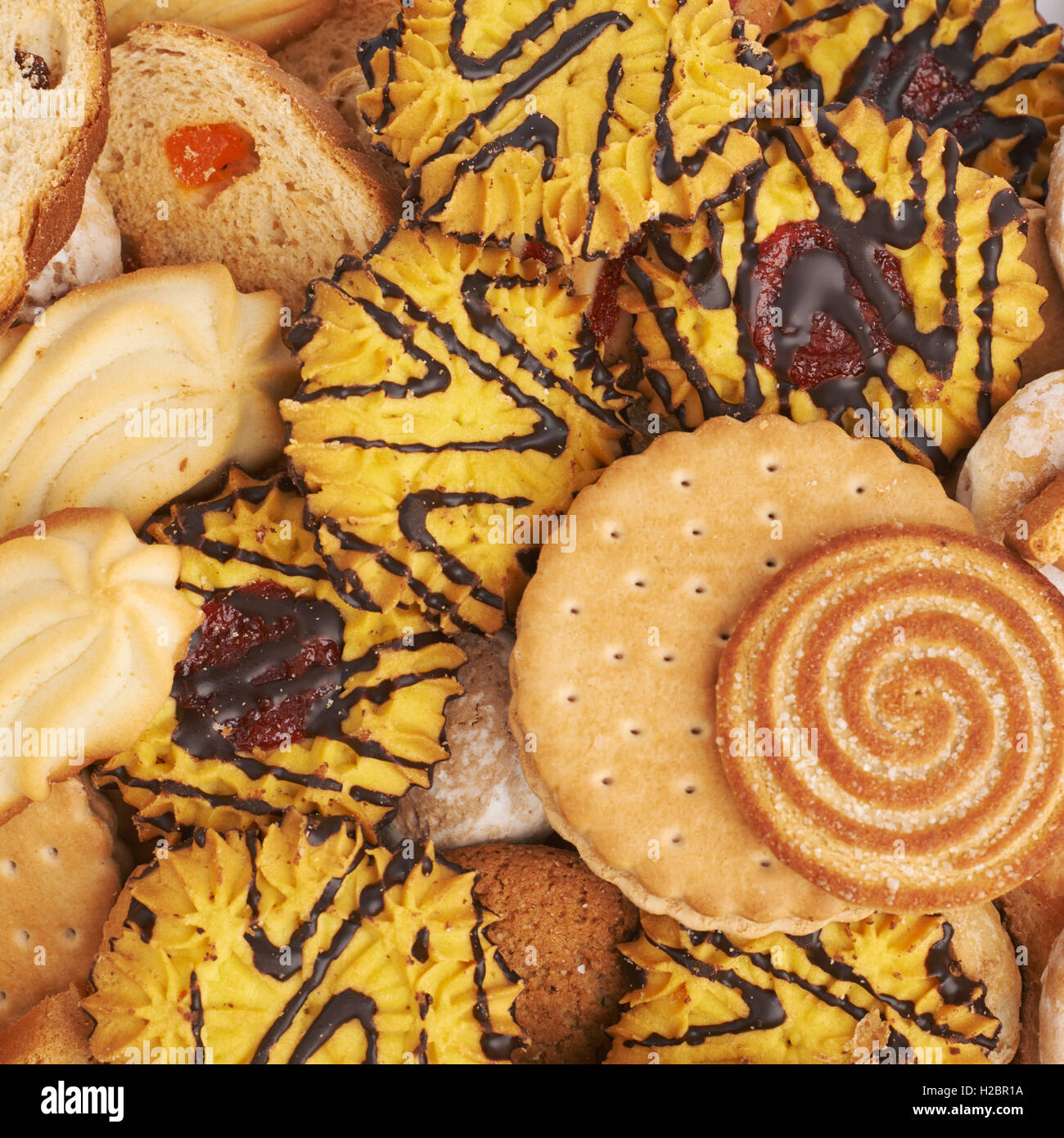 Pile of mix cookies isolated over the white background Stock Photo - Alamy