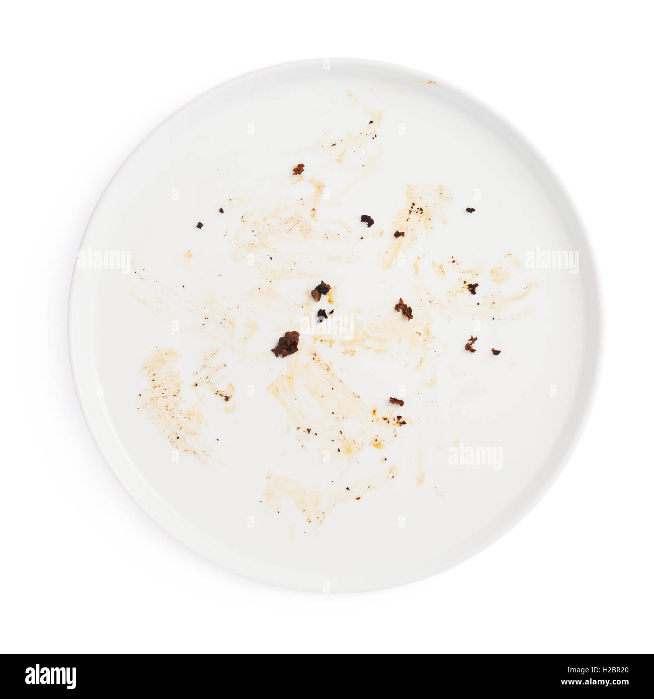 Dirty big plate over white isolated background Stock Photo - Alamy