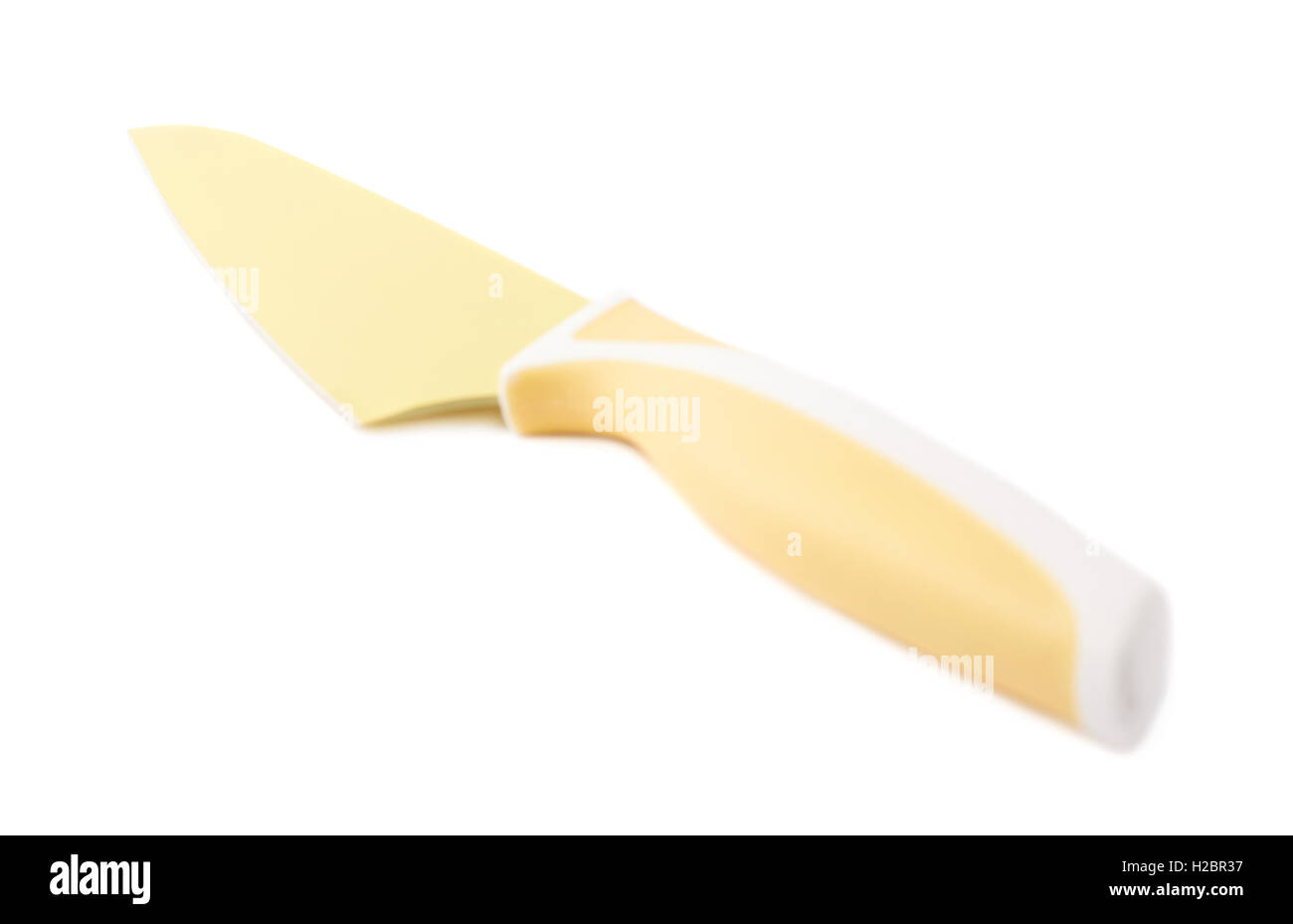 Steel yellow knife isolated over the white background Stock Photo - Alamy