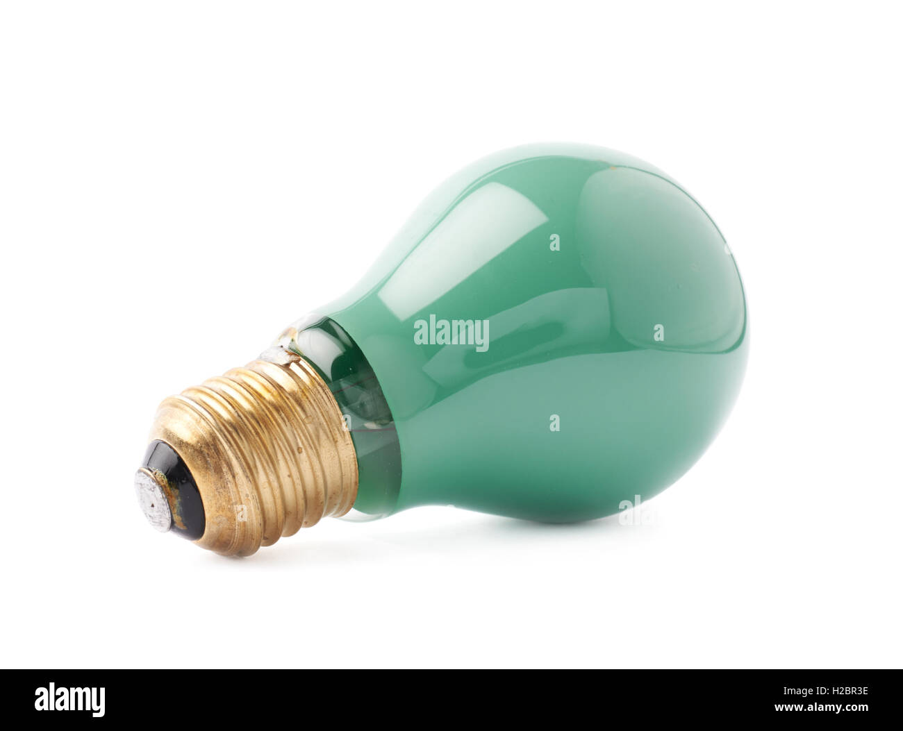 Single electric bulb lying on its side, isolated over the white ...