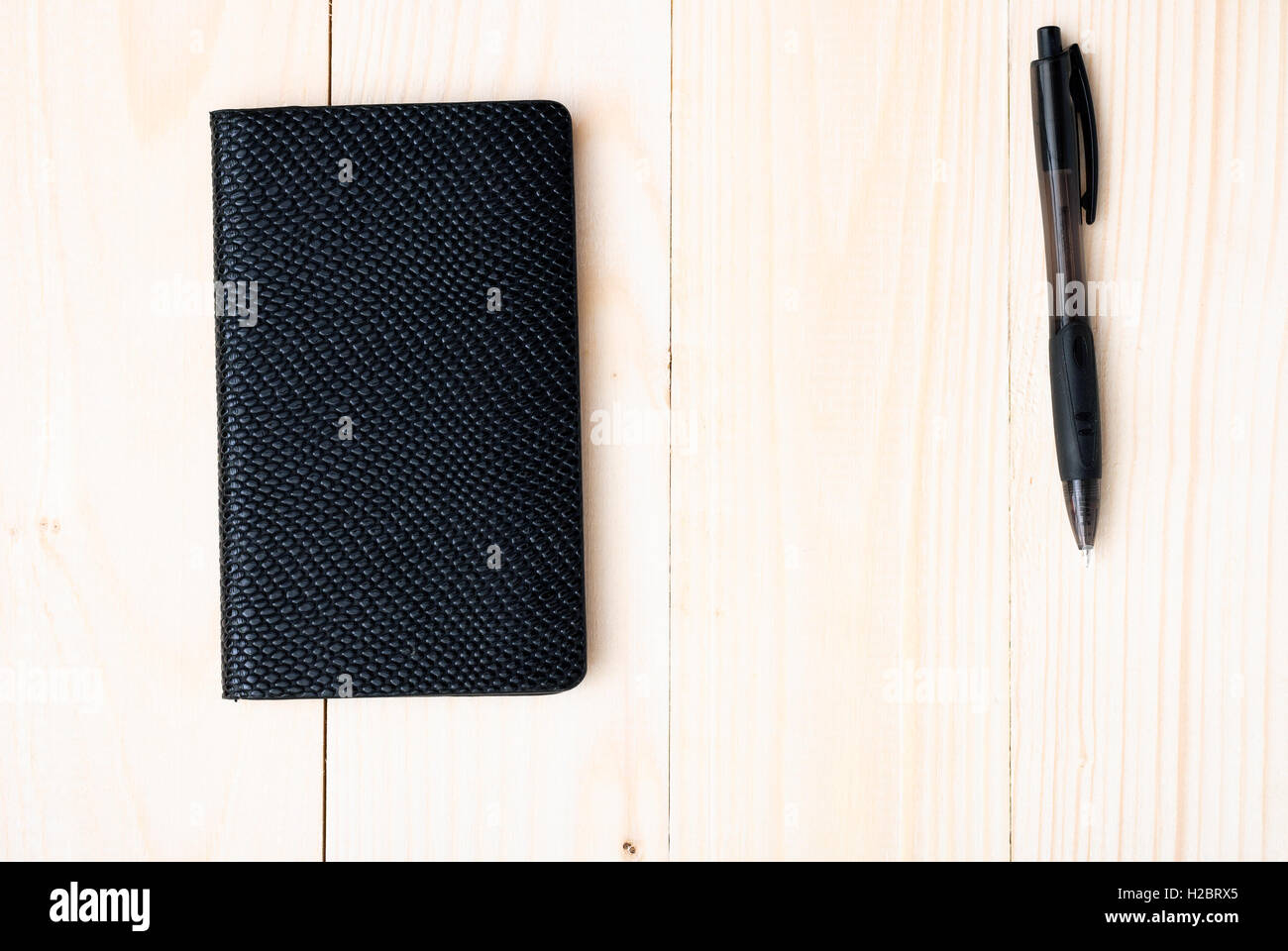 Small notepad with pen Stock Photo - Alamy