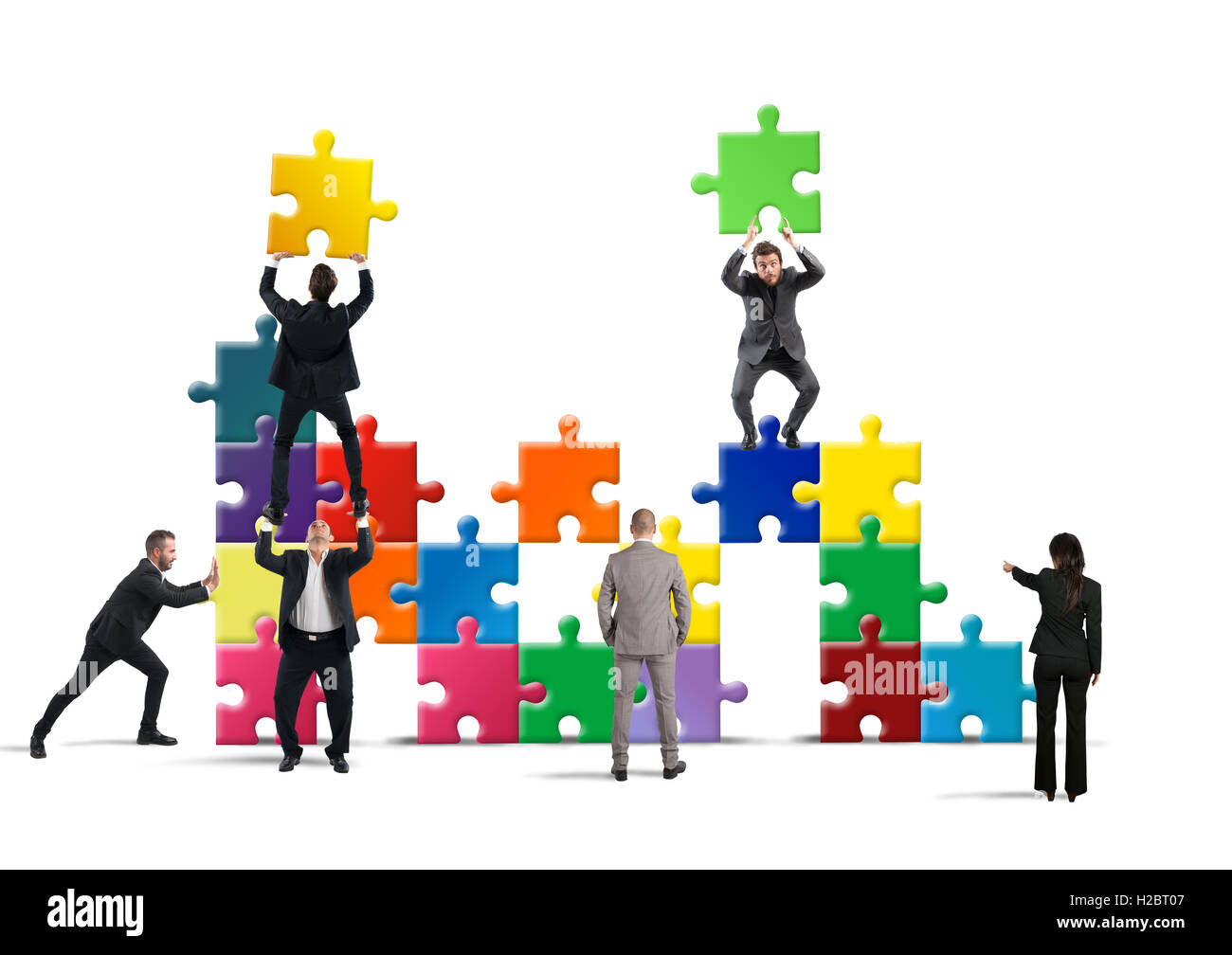 Team of businesspeople build a new company Stock Photo - Alamy