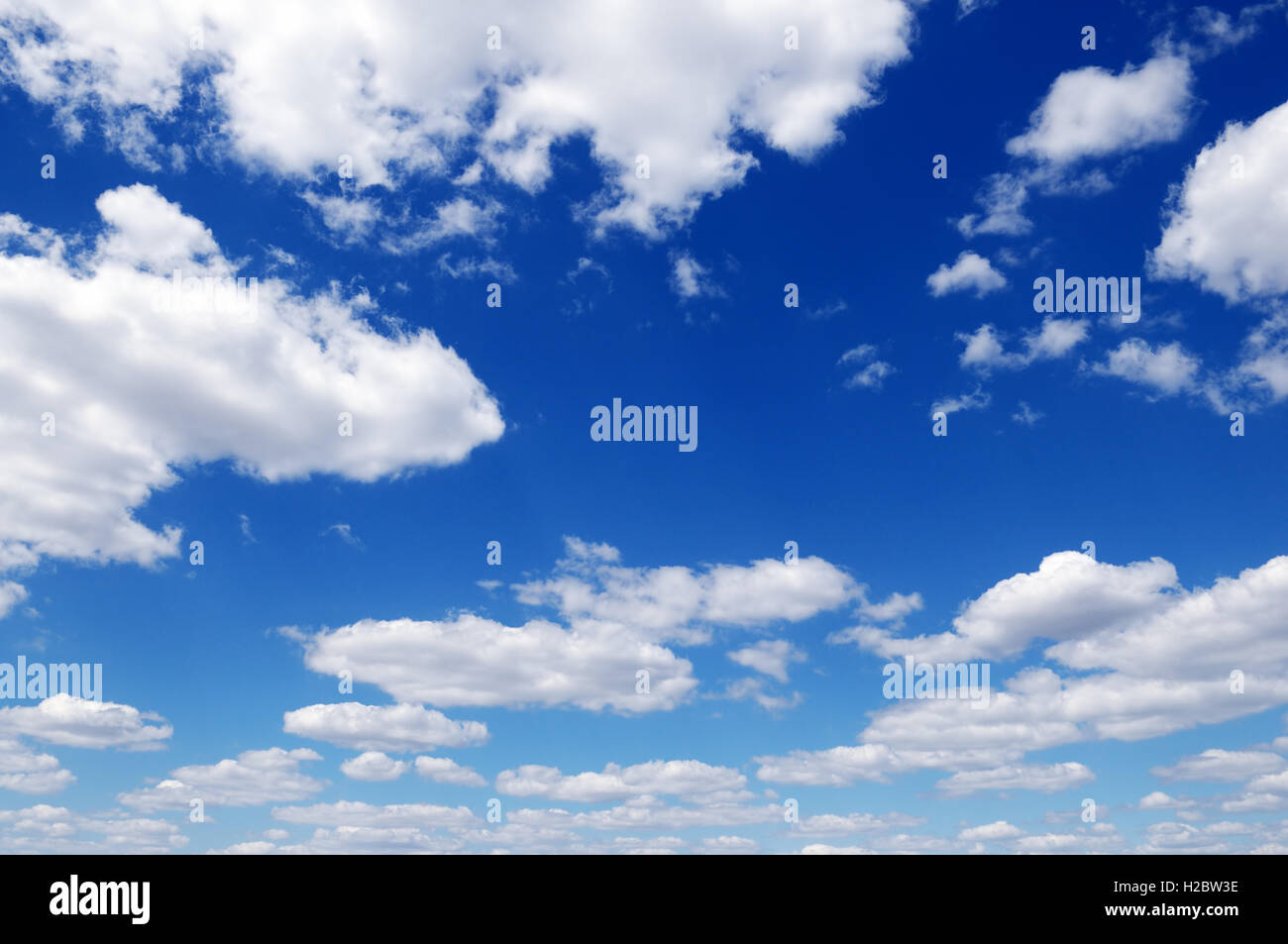 Light white clouds in blue sky. Heavenly landscape Stock Photo - Alamy