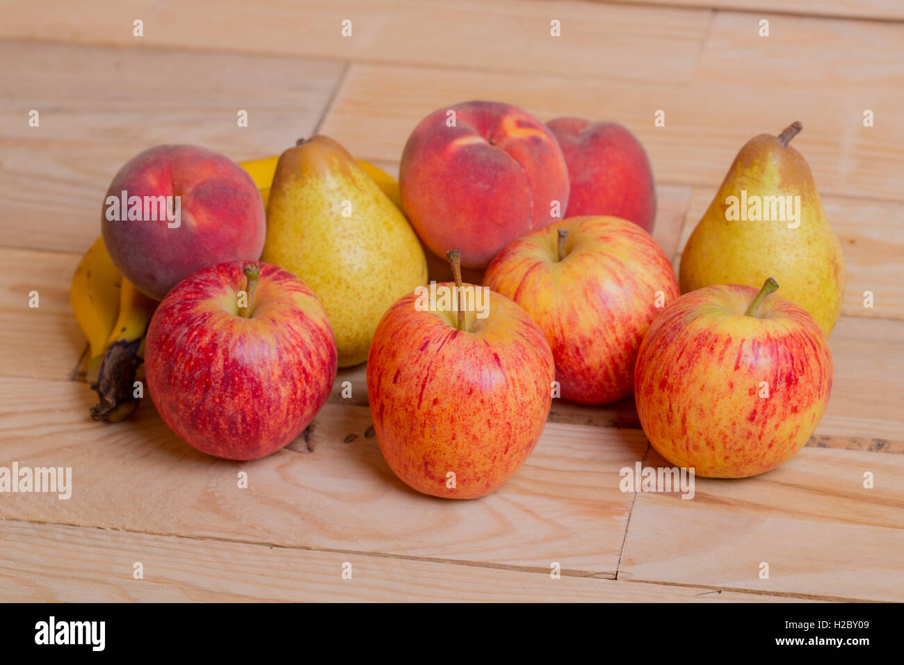 fruits on wooden table, studio picture Stock Photo - Alamy