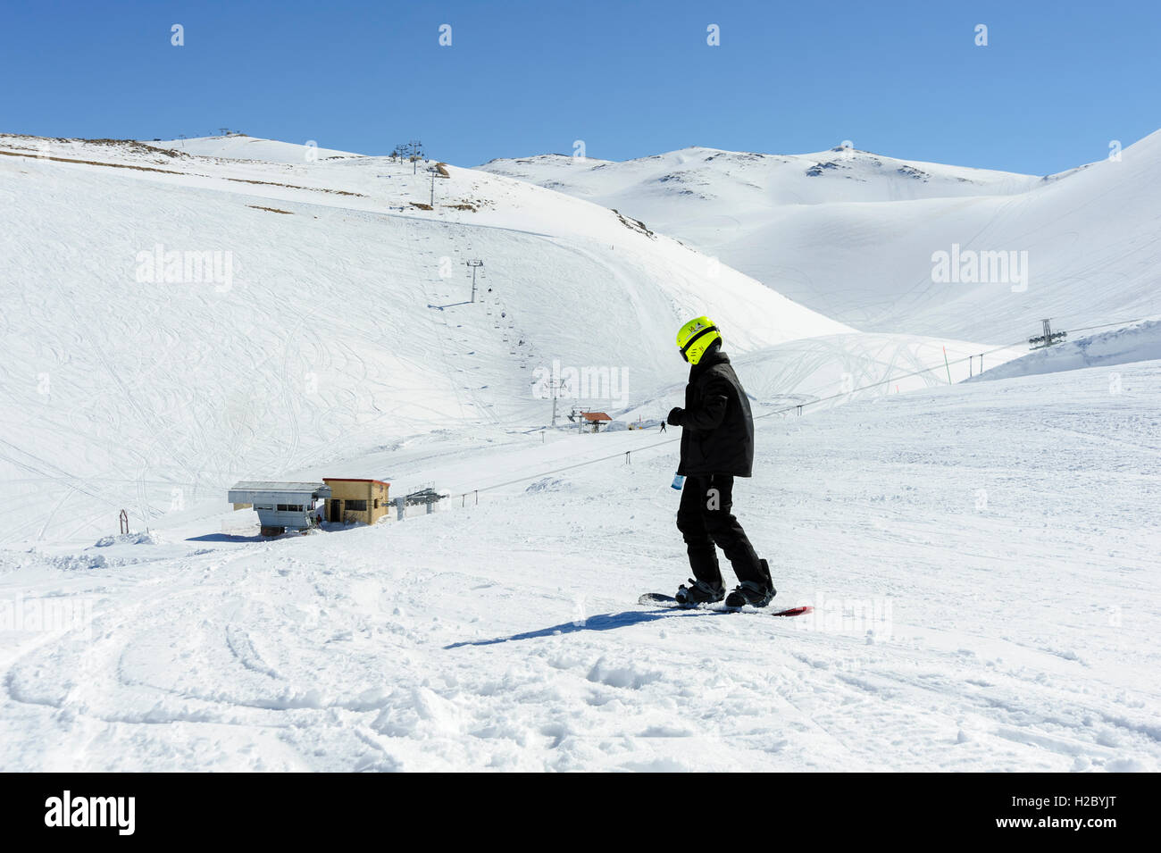 Teen snowboarding at Faraya or Mzaar Kfardebian ski resort, Lebanon ...