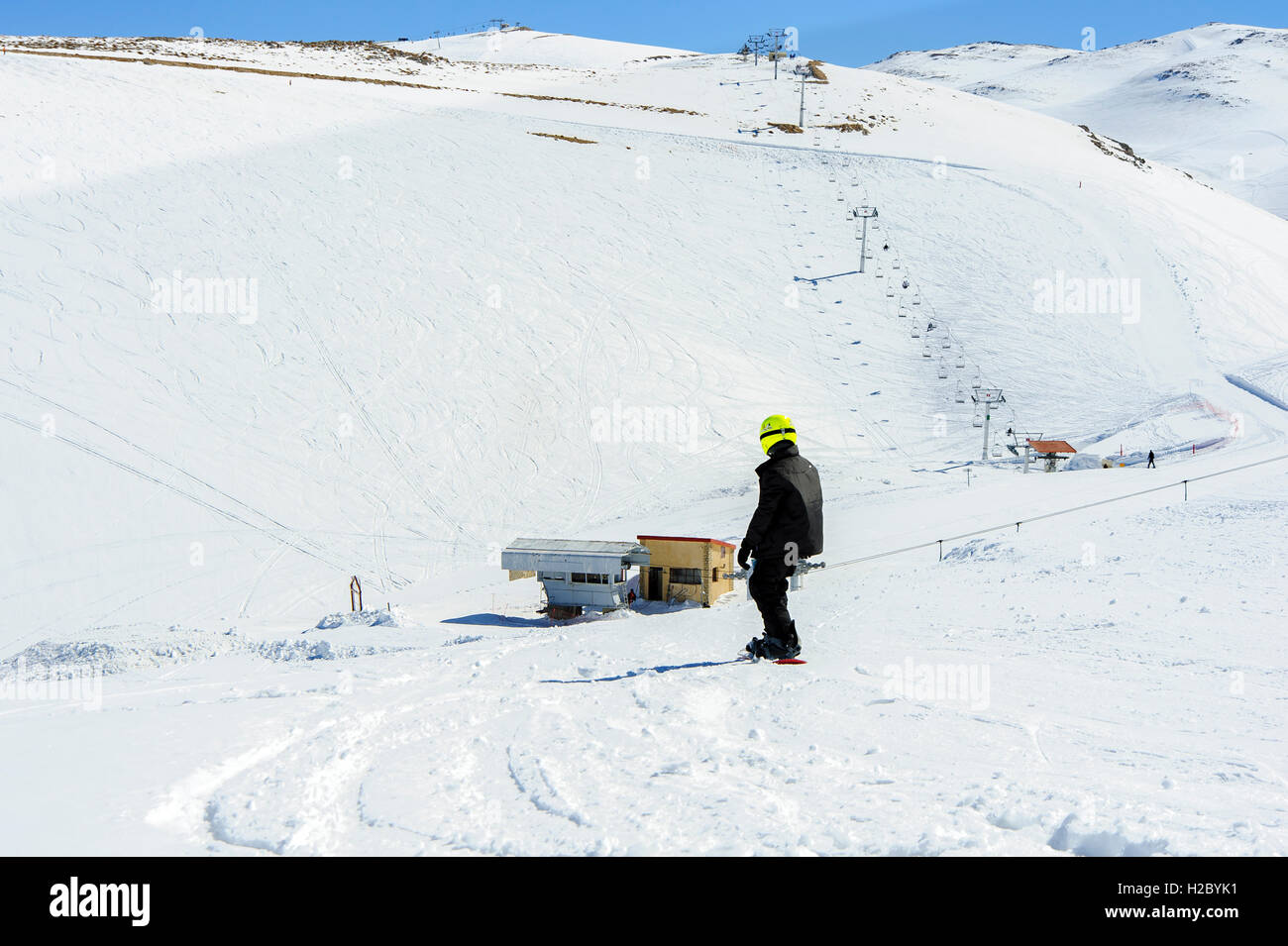 Teen snowboarding at Faraya or Mzaar Kfardebian ski resort, Lebanon ...