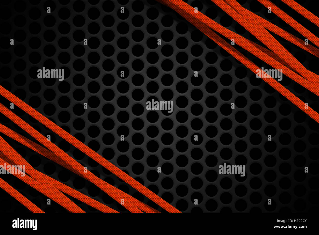 orange carbon fiber frame on black mesh carbon background. metal ...