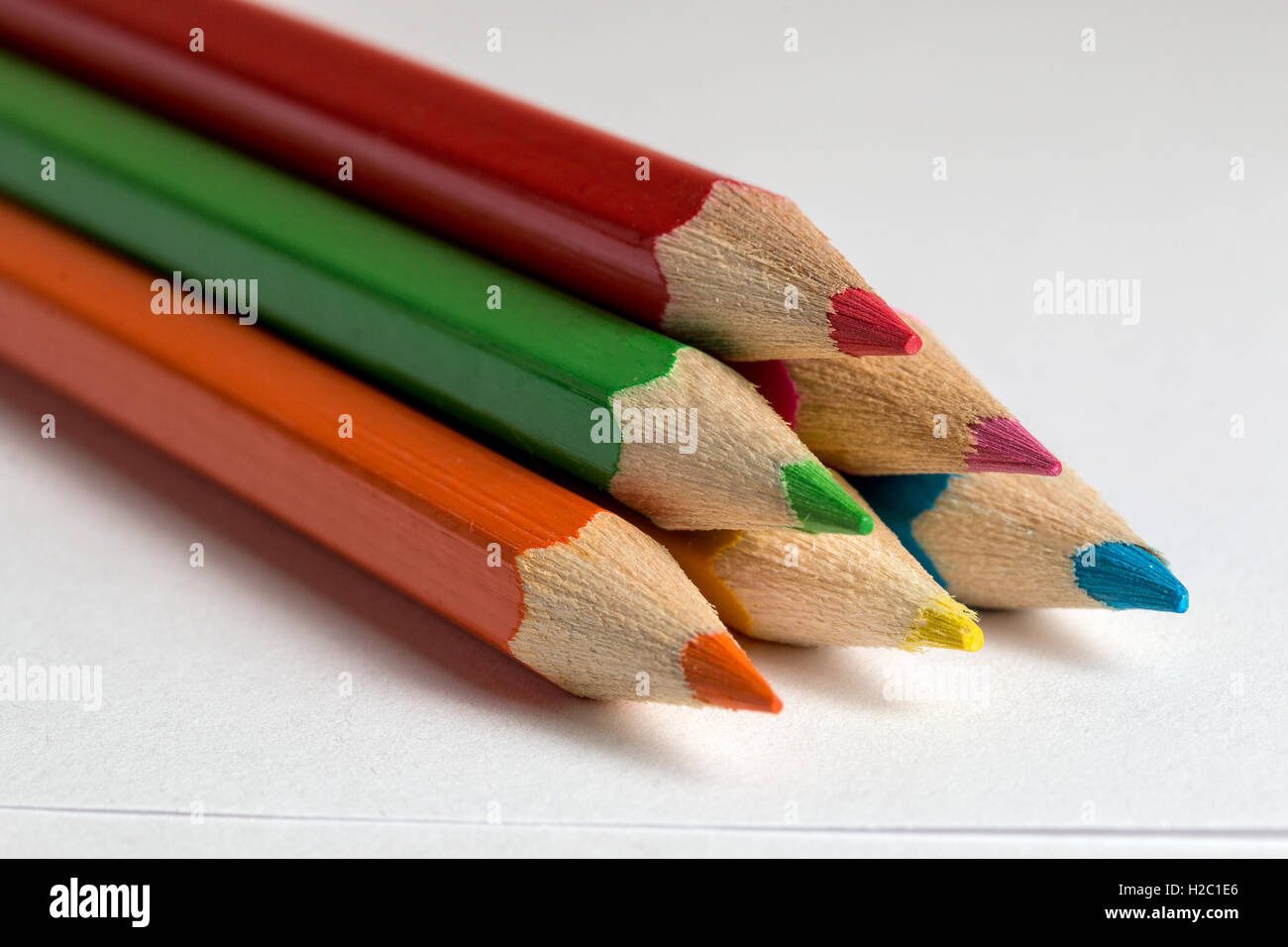 pencils for drawing stacked in a pyramid Stock Photo - Alamy
